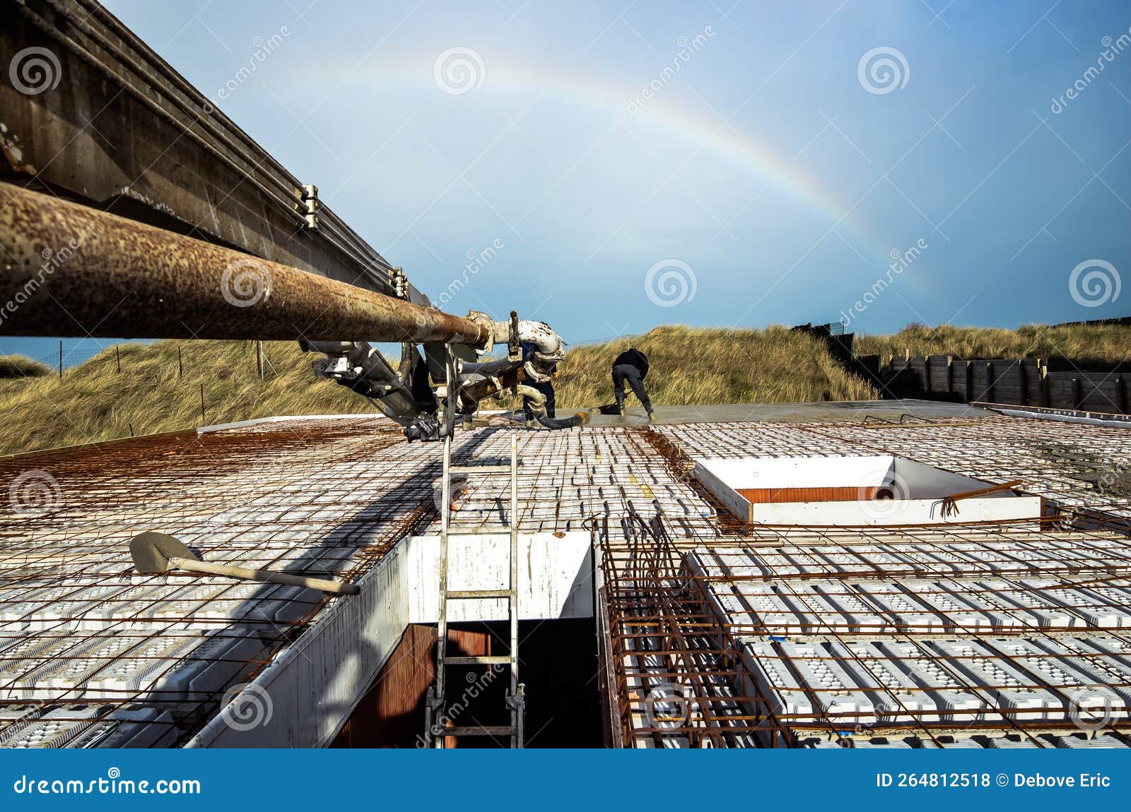 Team Pouring a Concrete Screed on a Construction Site of a Detached ...