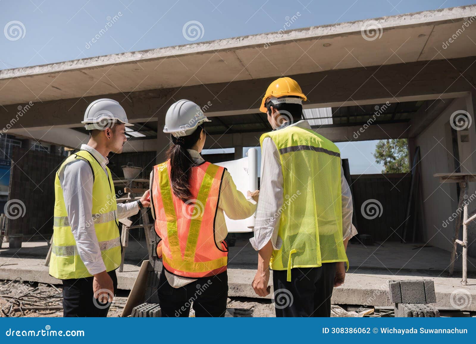Team of Professional Civil Engineers and Architects Holding Project ...