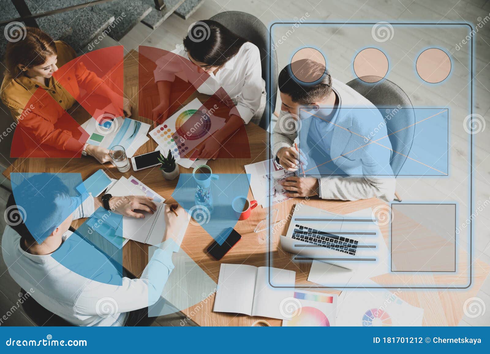 Team of Professional Designers Working at Table and Colorful Graphs ...