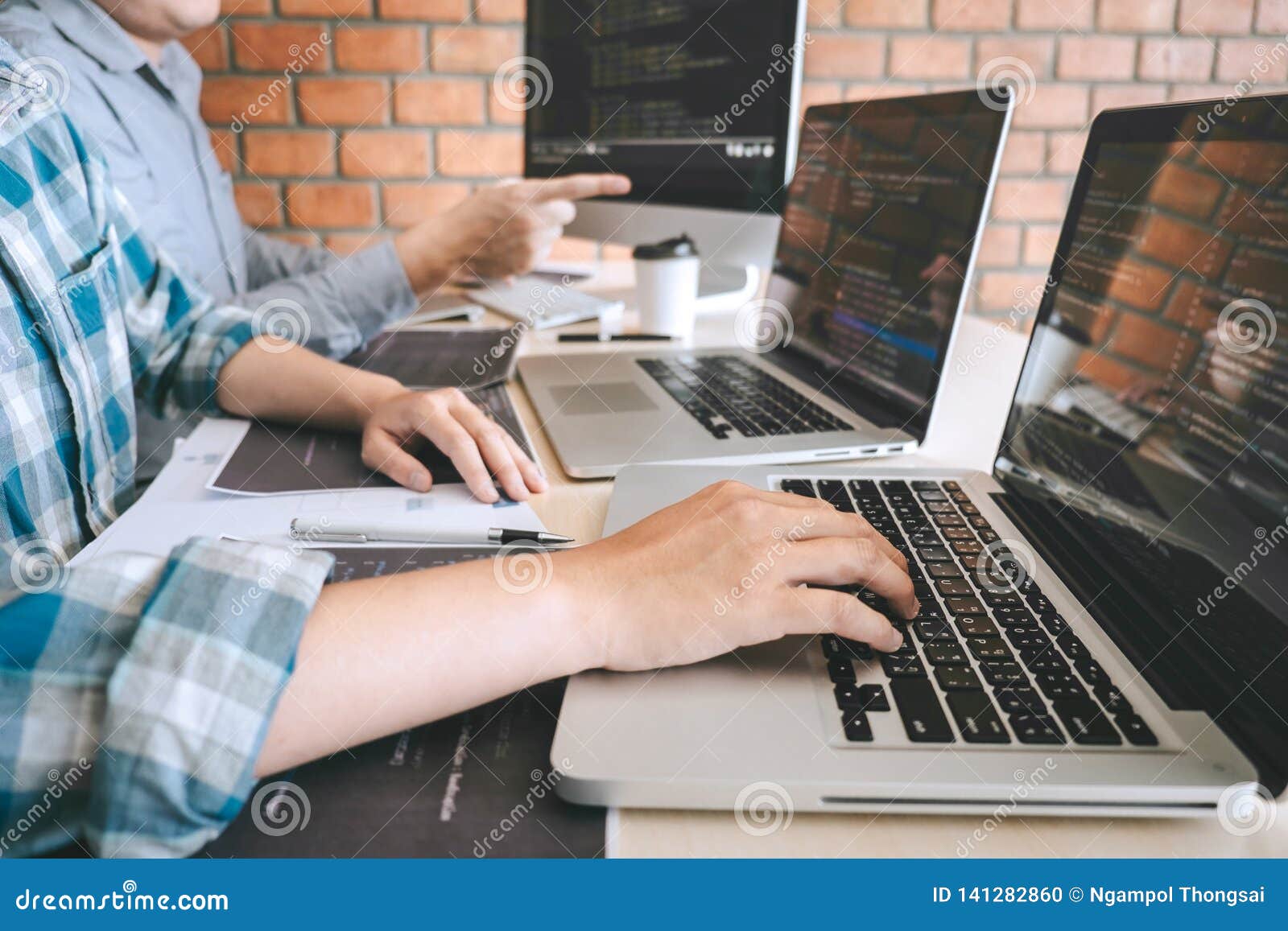 Team Of Professional Developer Programmer Cooperation Meeting And Brainstorming And Programming