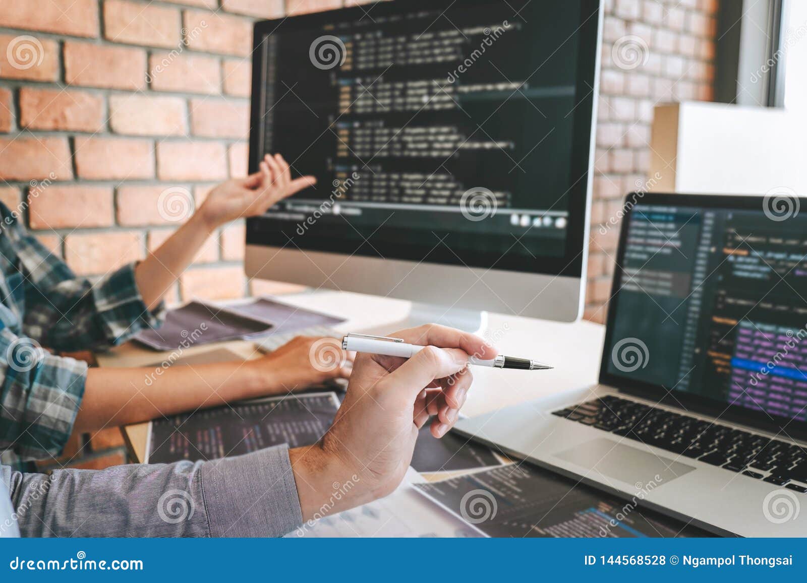 Team of Professional Developer Programmer Cooperation Meeting and Brainstorming and Programming ...