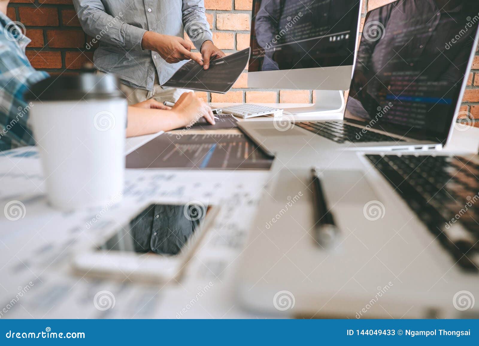 Team of Professional Developer Programmer Cooperation Meeting and Brainstorming and Programming ...