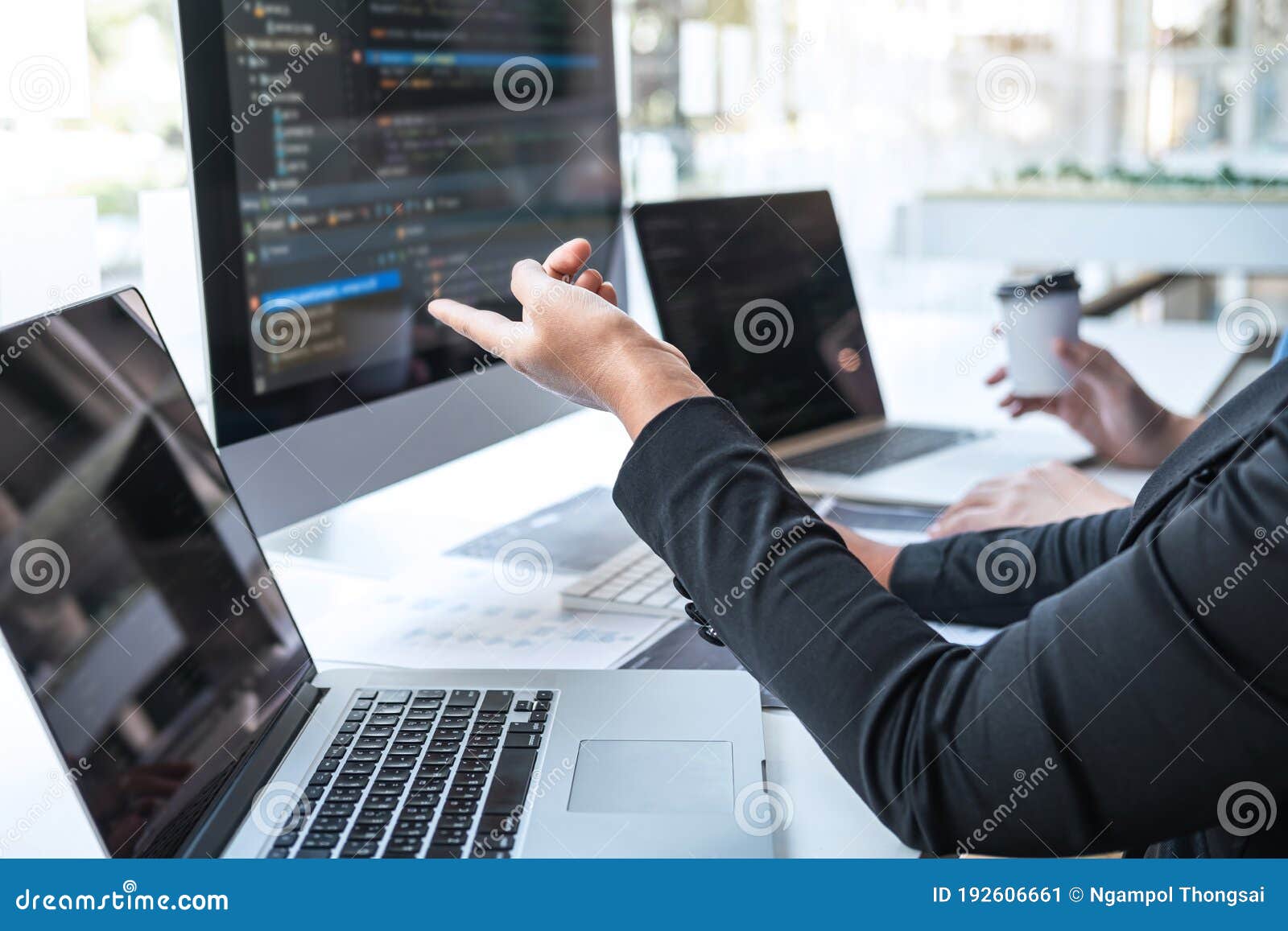 Team Of Professional Developer Programmer Cooperation Meeting And Brainstorming And Programming