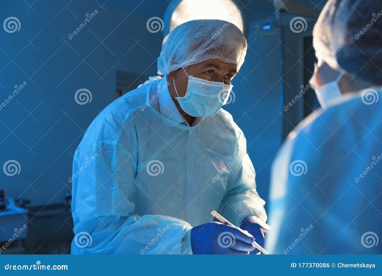 Team of Professional Doctors Performing Operation in Room Stock Photo ...