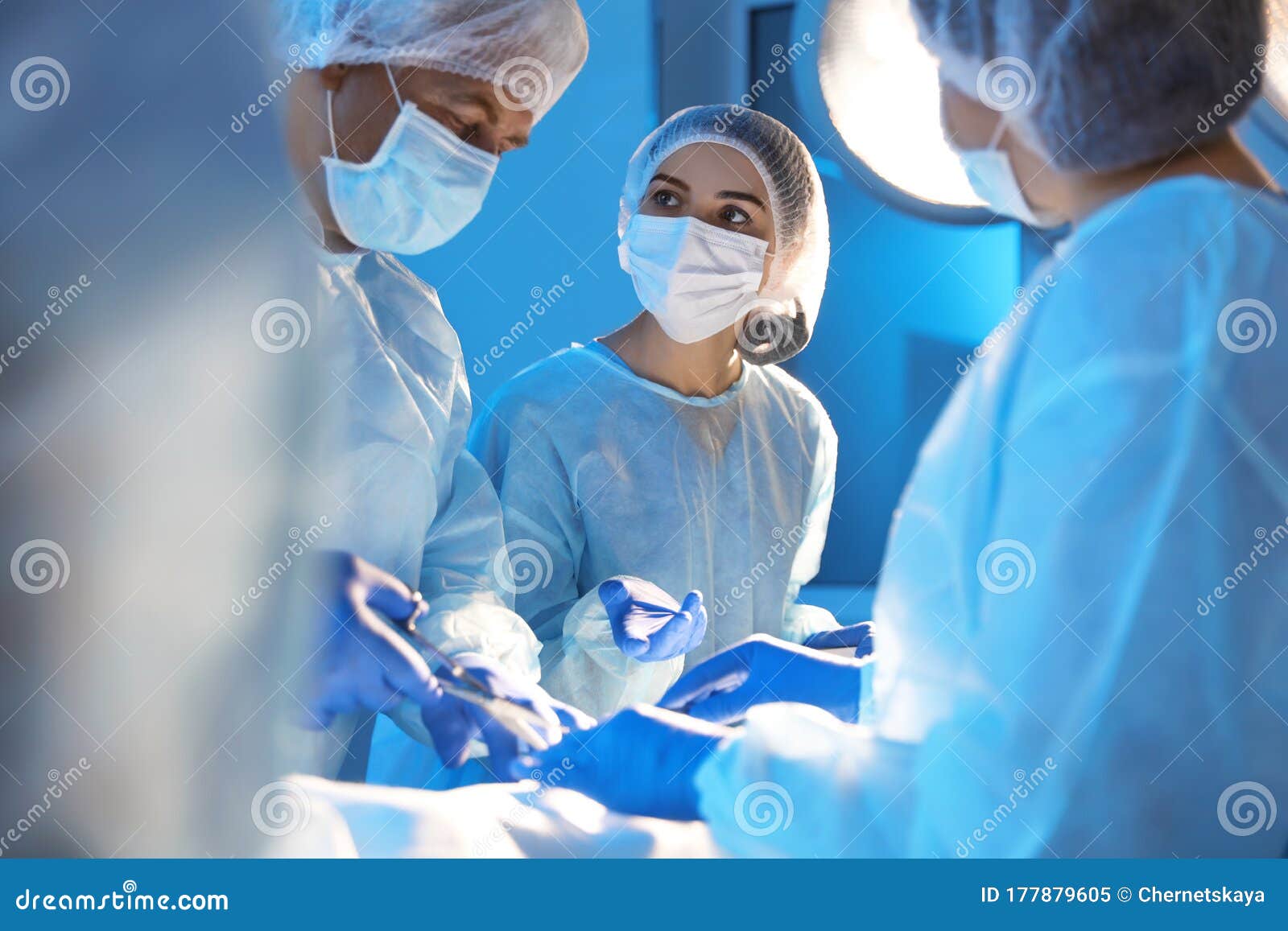 Team of Doctors Performing Operation in Surgery Room Stock Image ...