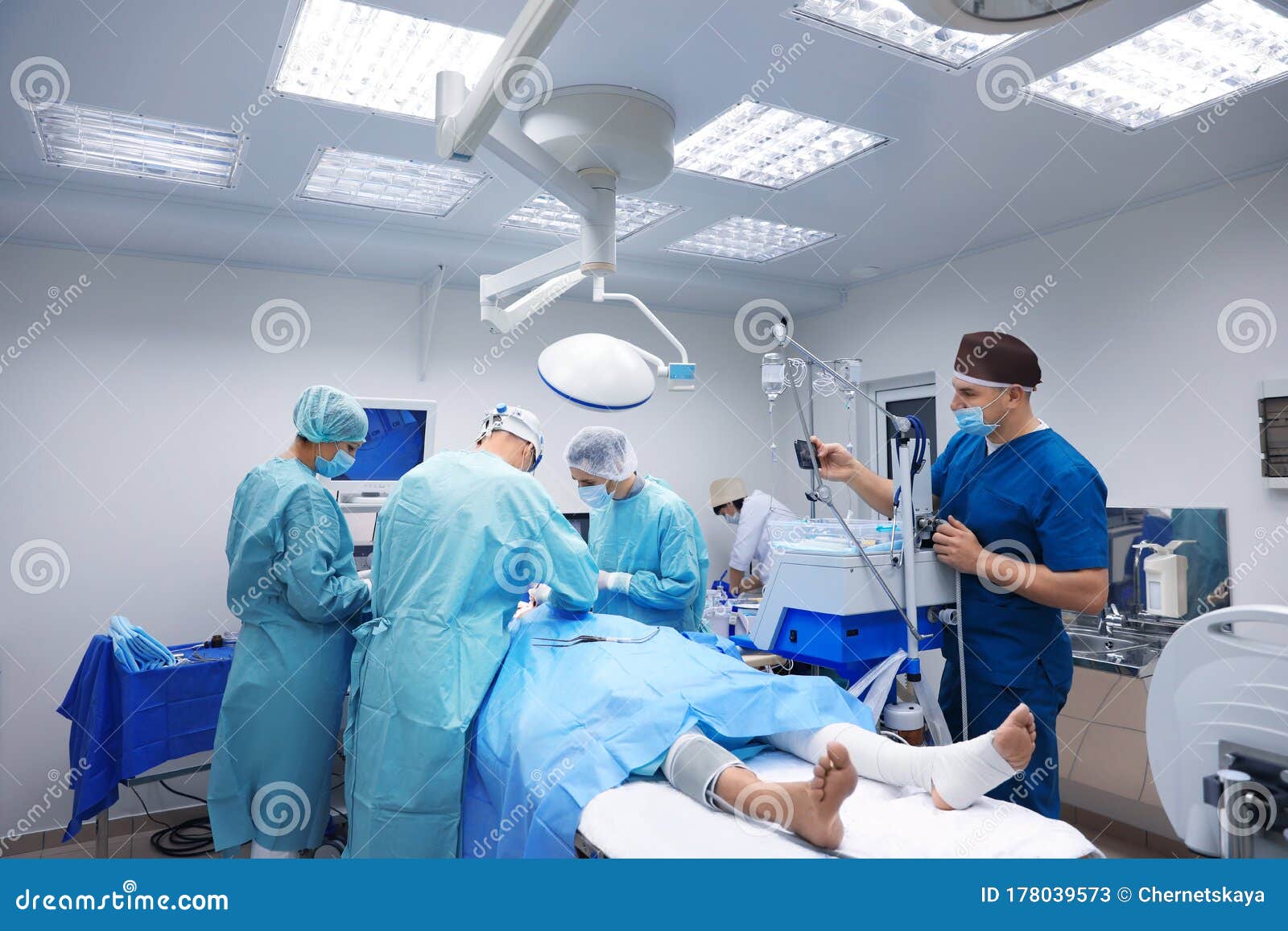 Team of Doctors Performing Operation in Surgery Room Stock Image ...
