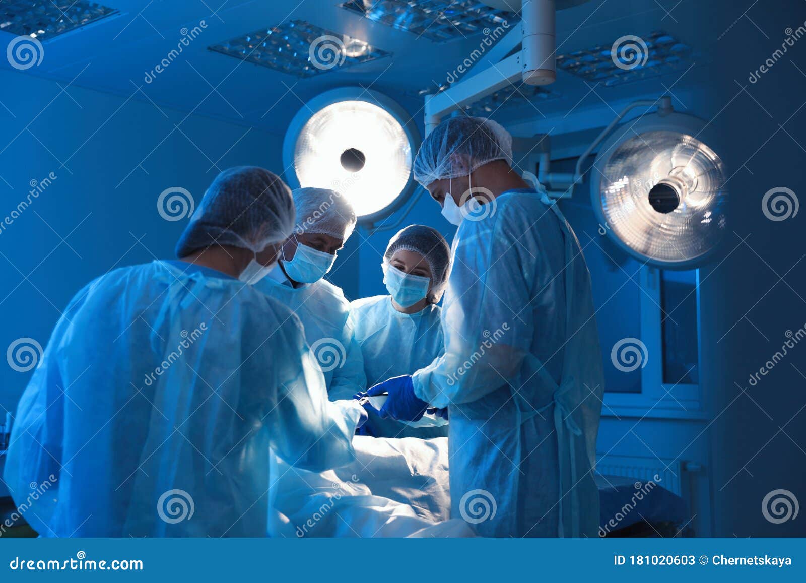 Team of Doctors Performing Operation in Surgery Room Stock Image ...