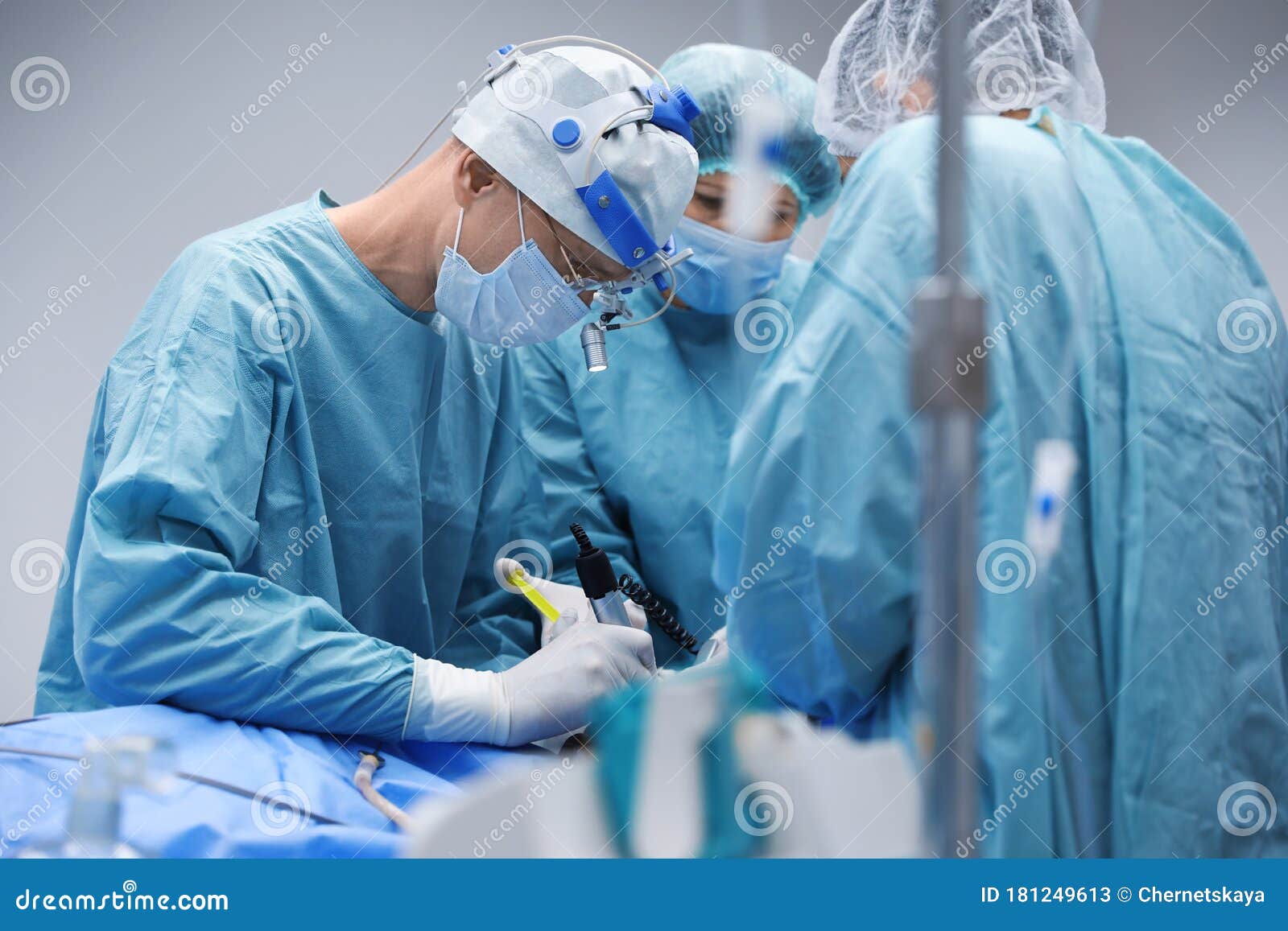 Team of Doctors Performing Operation in Surgery Room Stock Image ...