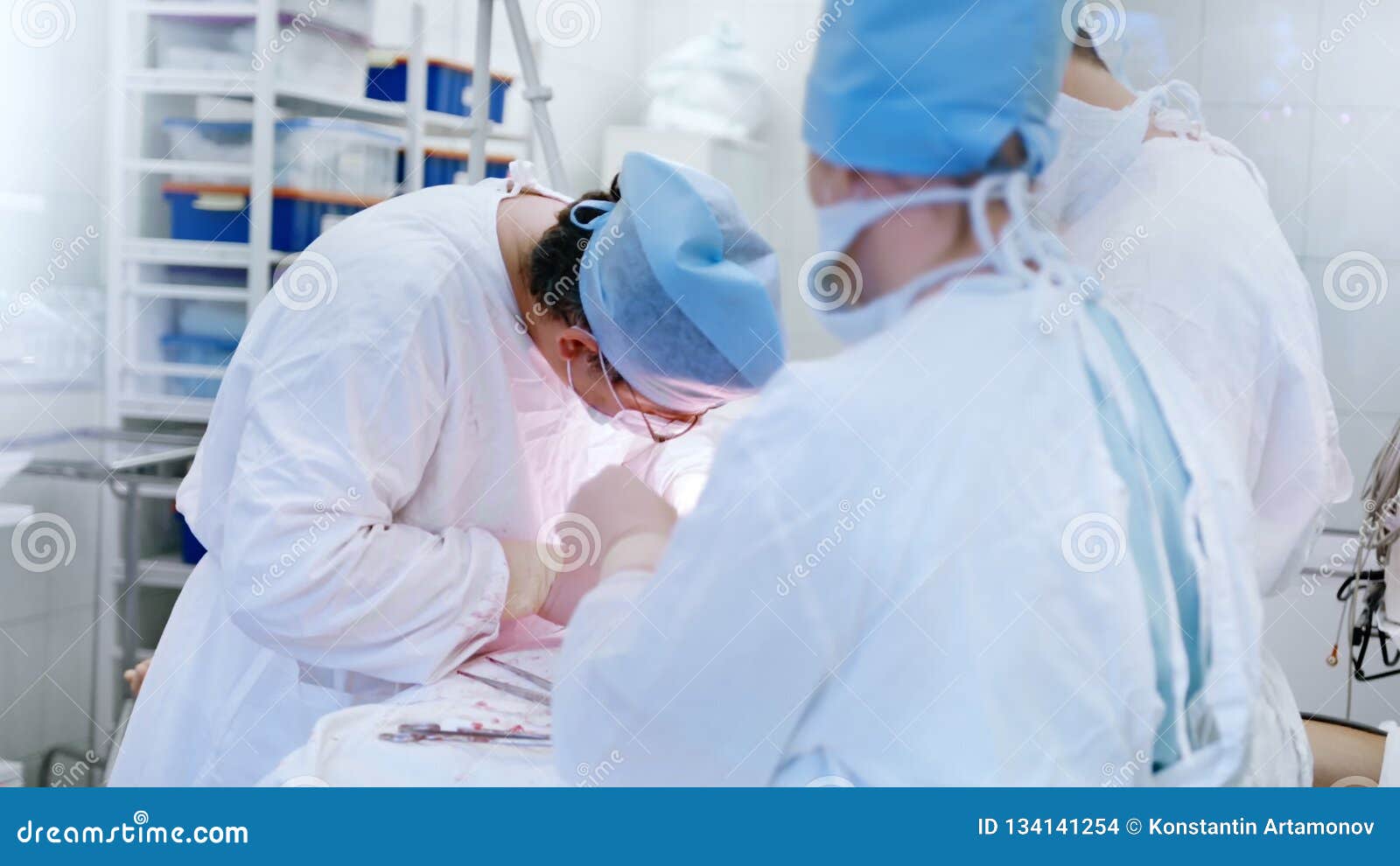 Team of Professional Doctors Performing Operation To Remove Appendix in ...