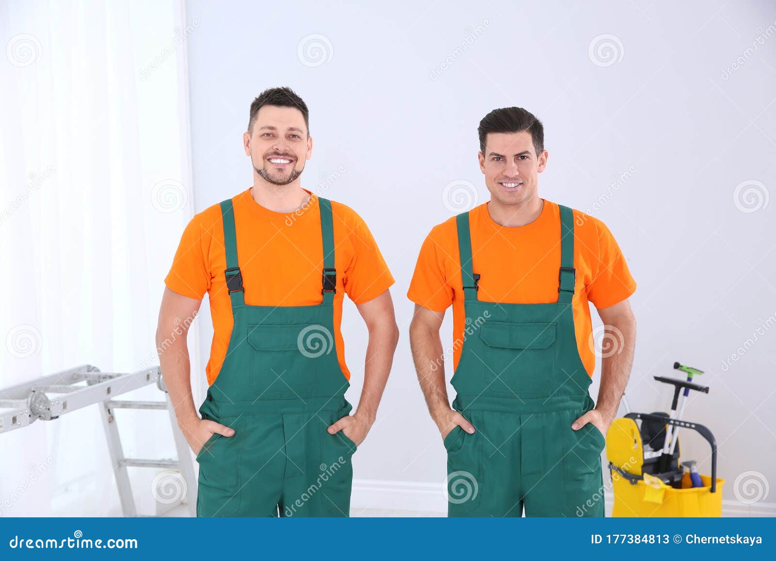 Team of Professional Janitors in Uniform. Cleaning Service Stock Image ...
