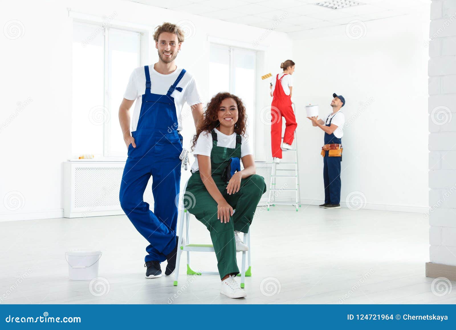 Team of Professional Painters with Tools Working Stock Photo - Image of ...