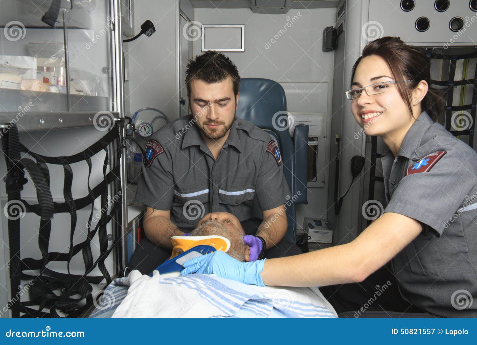 Team of Professional Paramedics Giving Unconscious Stock Image - Image ...
