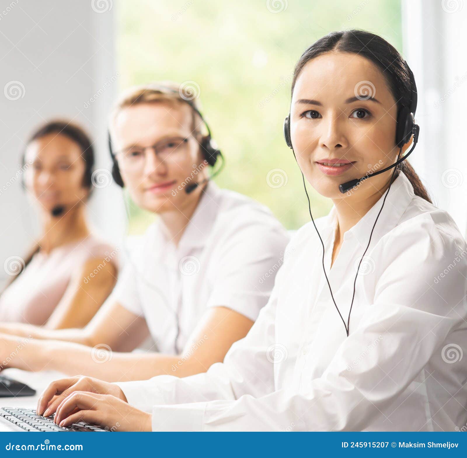 Team of Professional Support Staff Working in the Office. Colleagues in ...