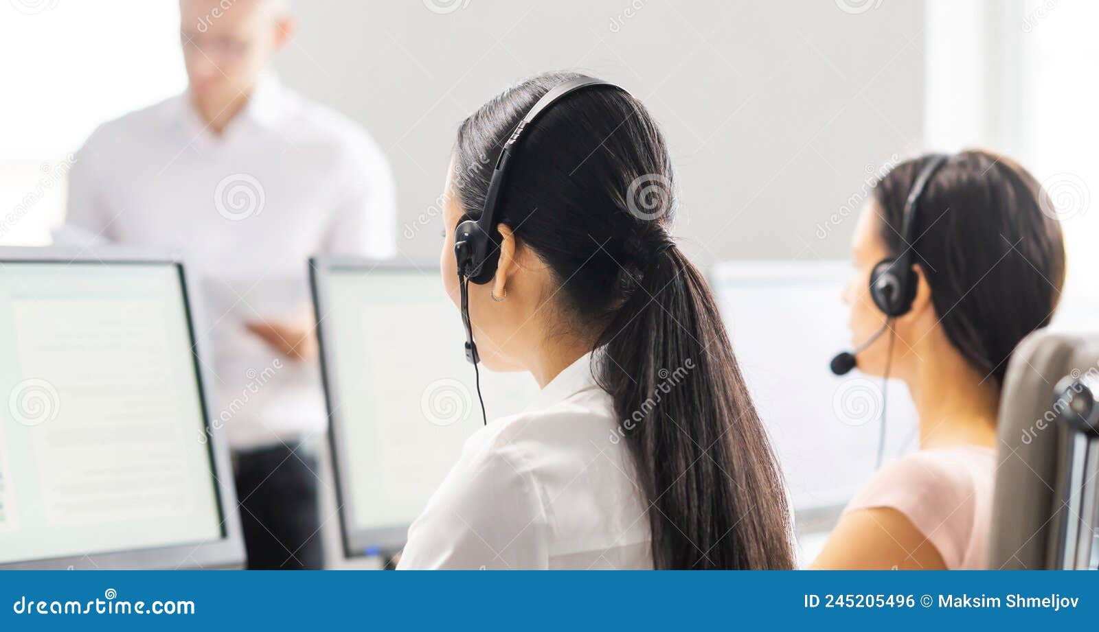 Team of Professional Support Staff Working in the Office. Colleagues in ...