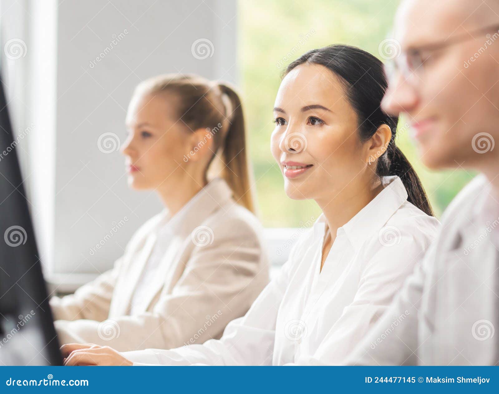 Team of Professional Support Staff Working in the Office. Colleagues in ...