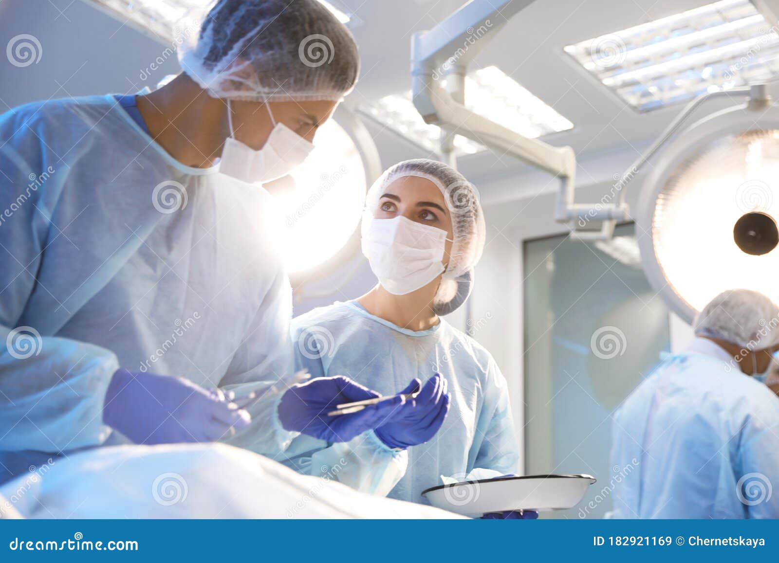 Team of Surgeons Performing Operation in Clinic Stock Image - Image of ...