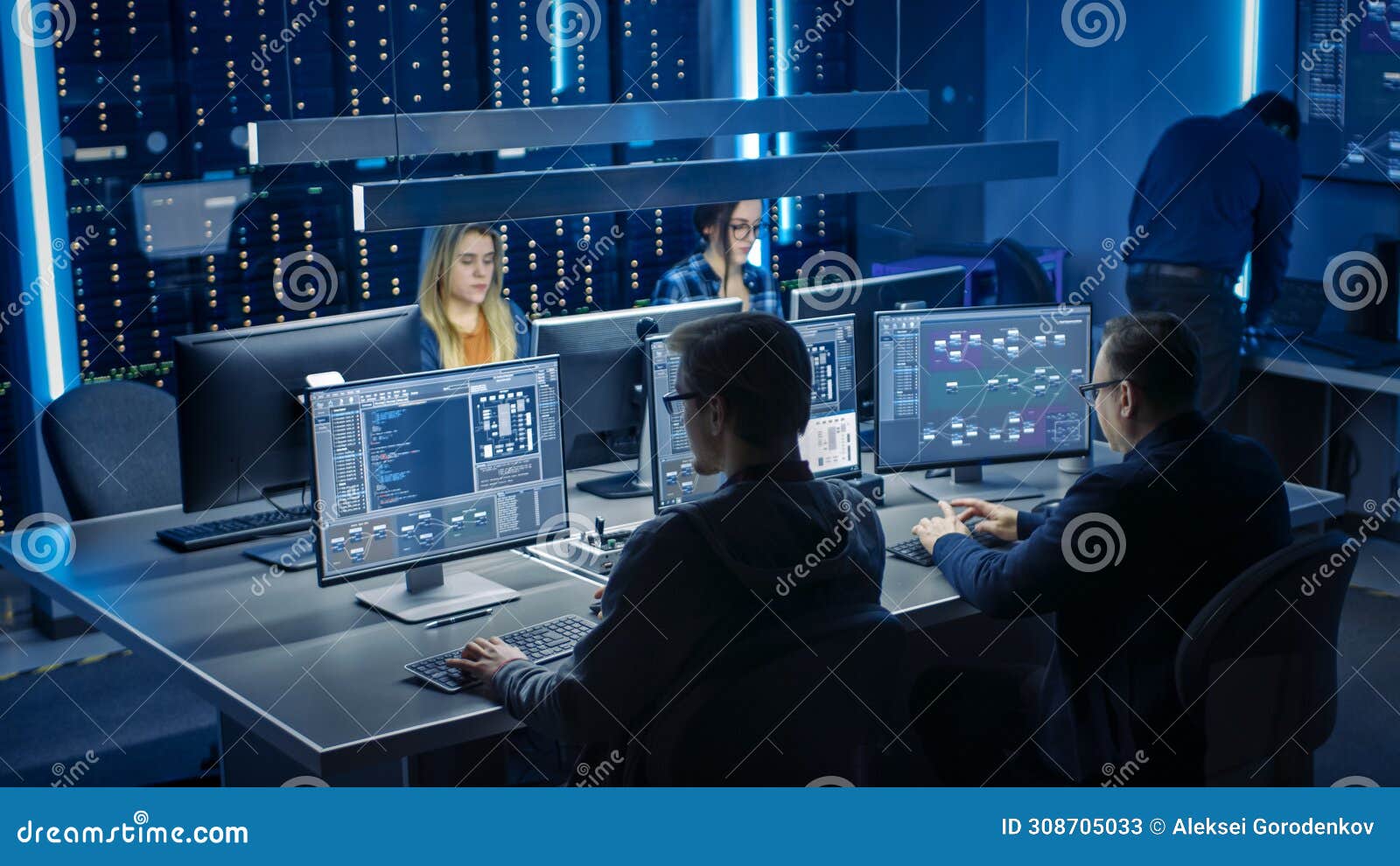 Team of it Programers Working on Desktop Computers in Data Center ...