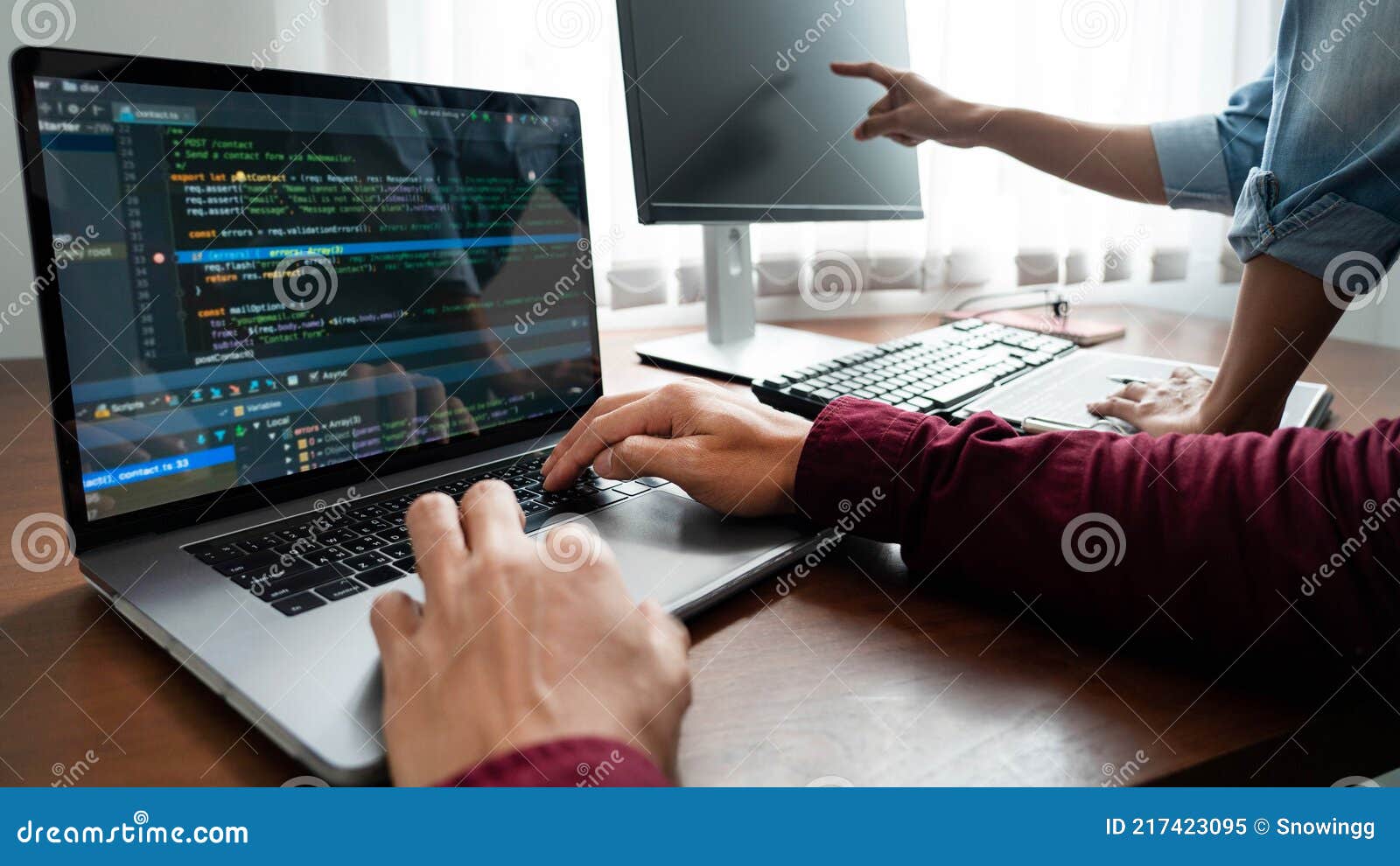 Team of Programmer Working To Find Solution To Problem and Coding Technologies in a Software ...