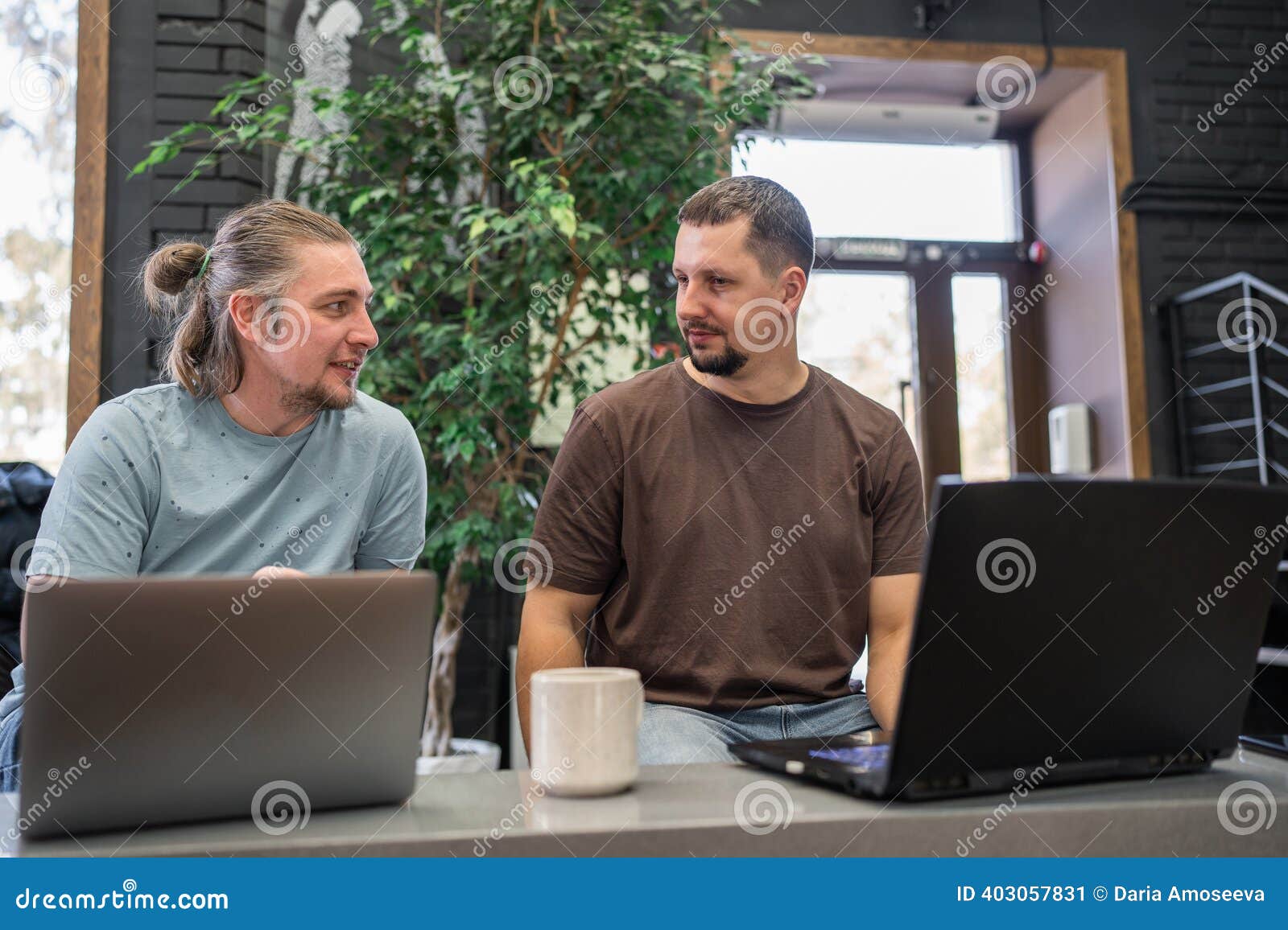 Programmers Collaborating On Group Project Compiling Algorithm For New Cloud Computing User ...