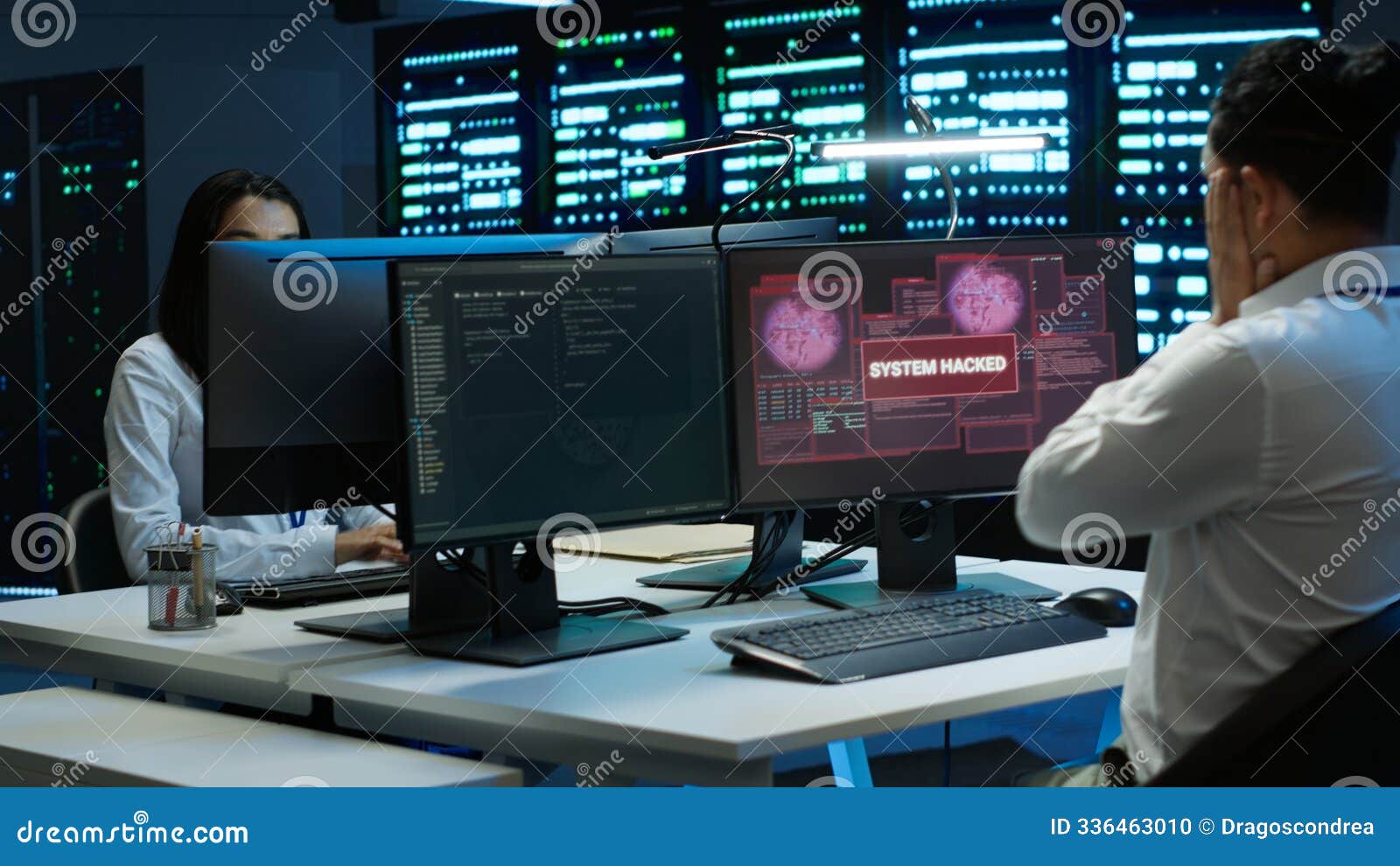 Team of Programmers in Server Hub Trying To Protect Hardware from ...