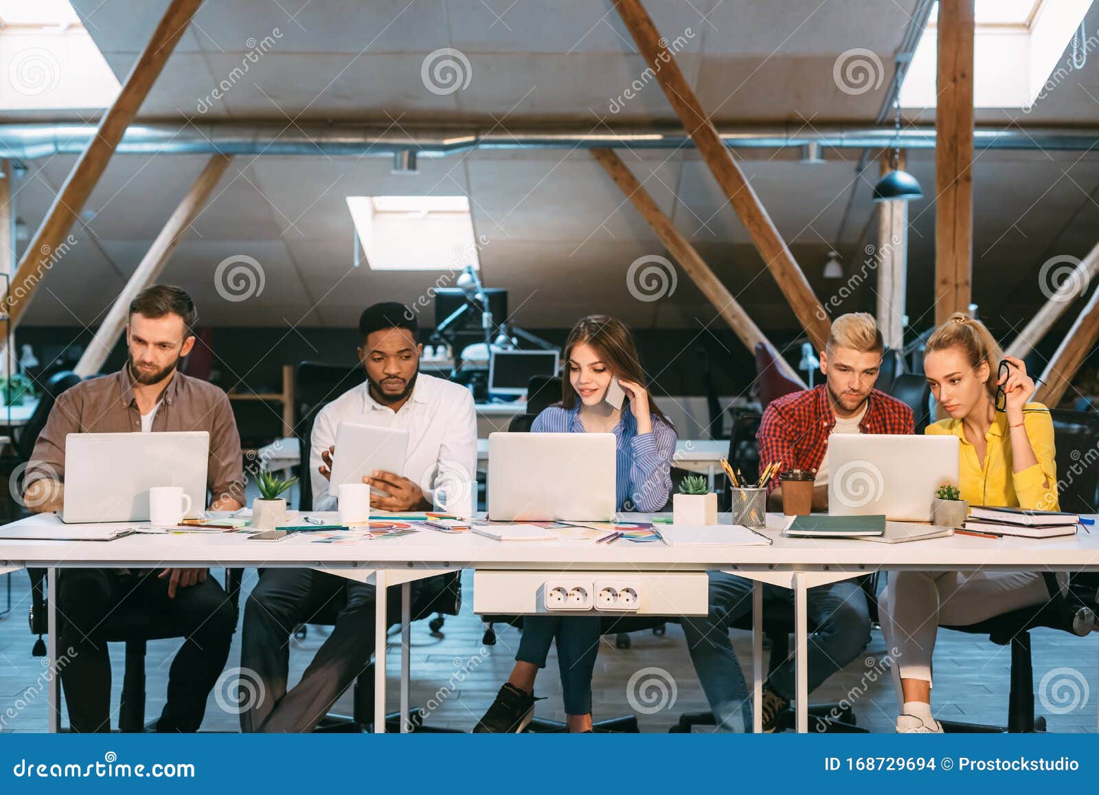 Team of Programmers Working in Software Developing Company Stock Photo ... Team of Programmers Working in Software Developing Company Stock Photo ...