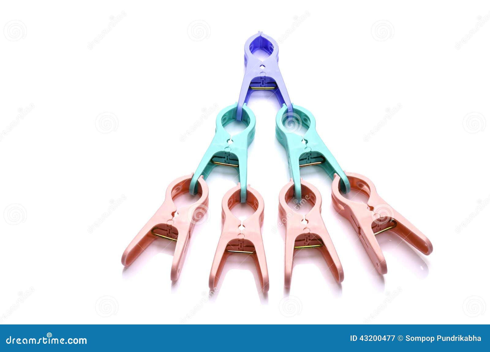 Team Pyramid of Plastic Clothespin on White Background Stock Image ...