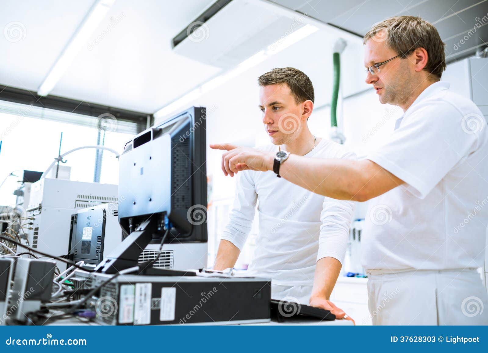 Team of Researchers Carrying Out Experiments in a Lab Stock Image ...