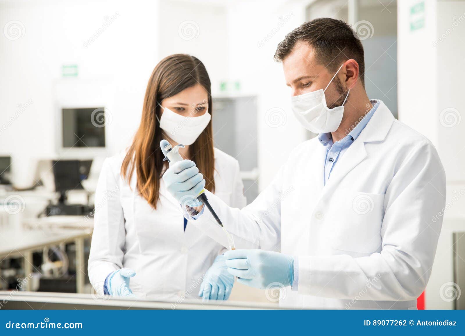 Team of Scientists Doing Some Work in a Lab Stock Photo - Image of ...