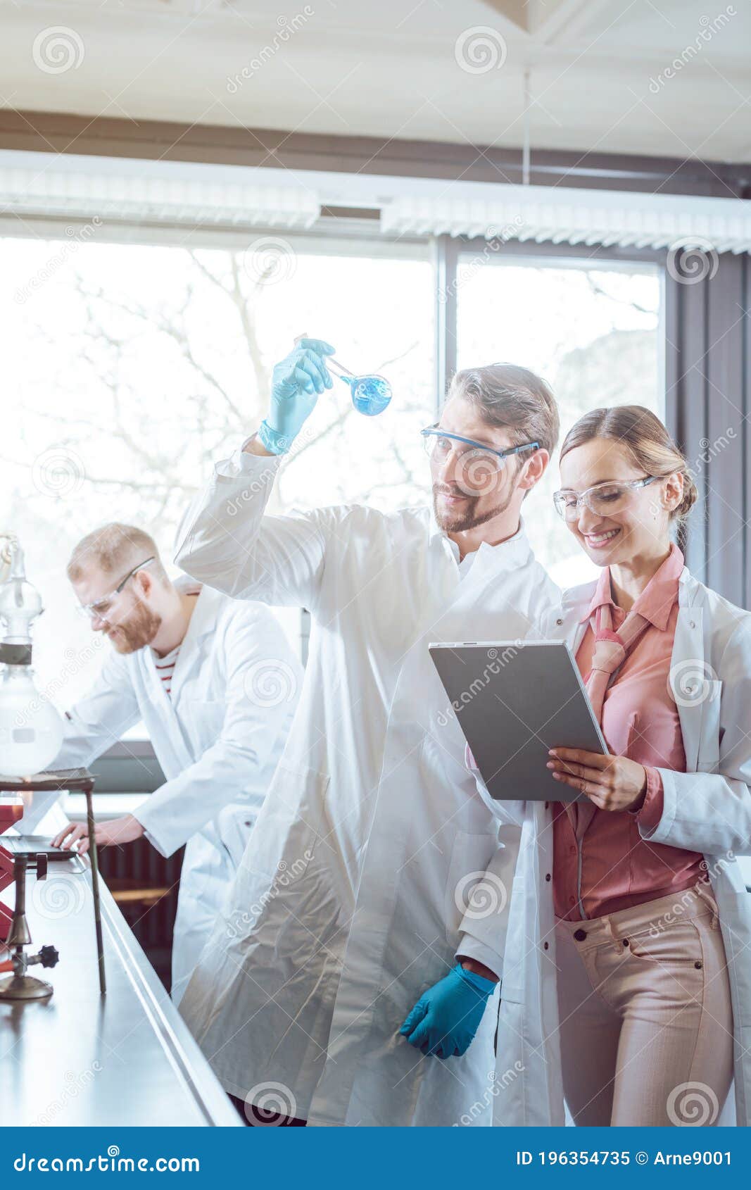 Team of Scientists during Experiment in the Lab Stock Image - Image of ...