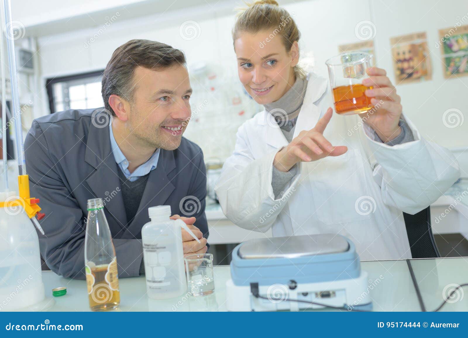 Team Scientists in Laboratory Working on Chemical Testing Stock Photo ...