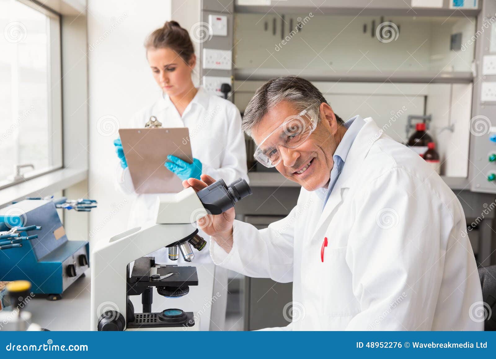 Team of scientists at work stock photo. Image of caucasian - 48952276