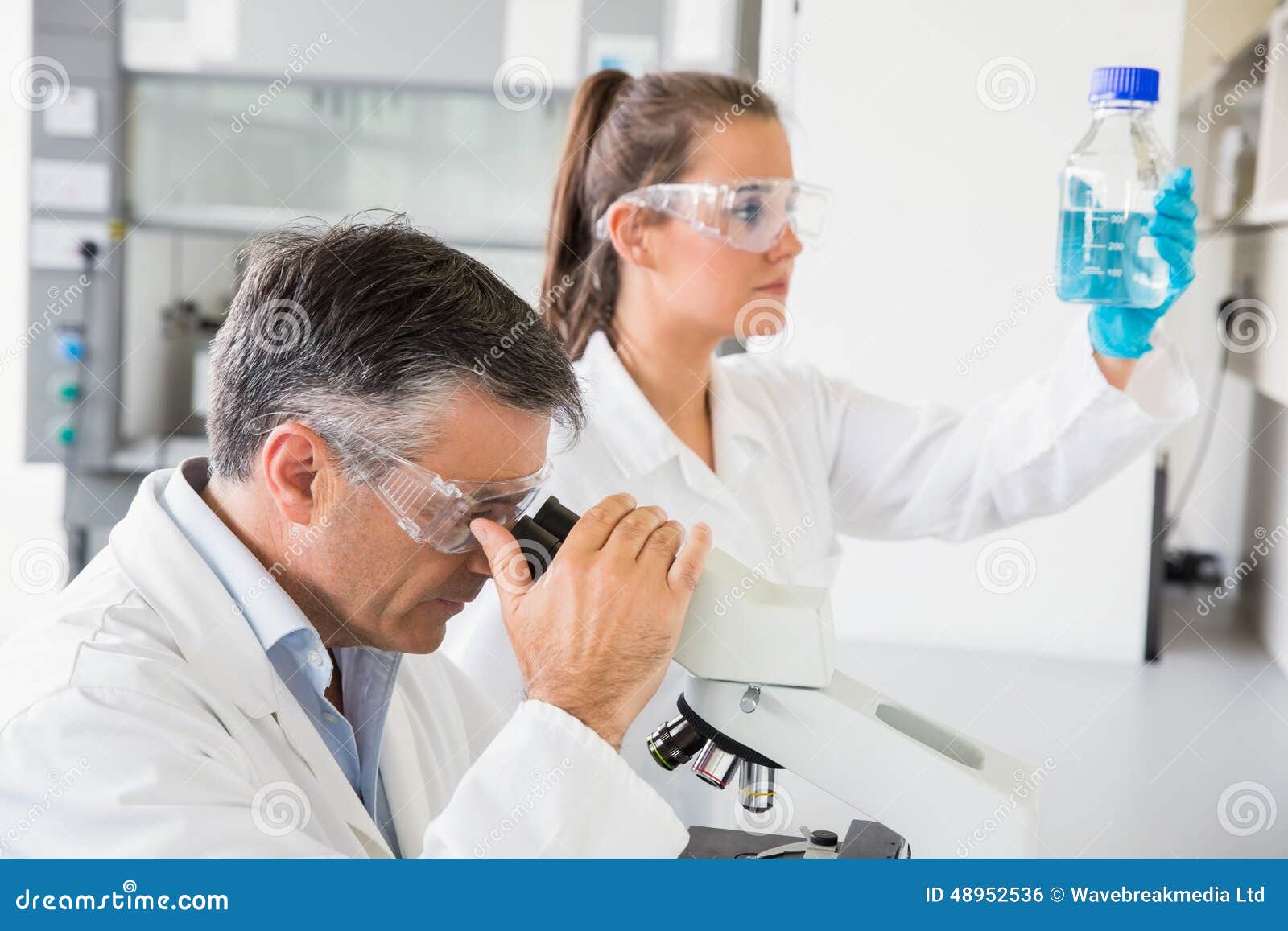 Team of scientists at work stock photo. Image of people - 48952536
