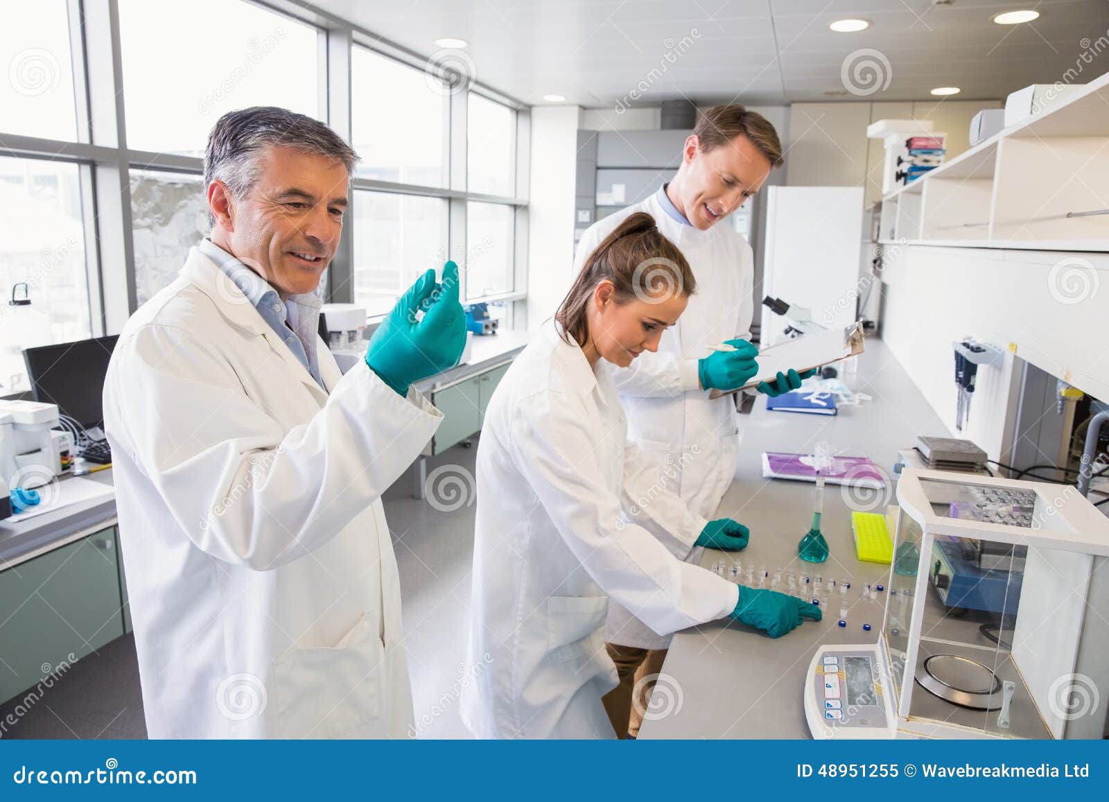 Team of Scientists Working Together Stock Image - Image of experiment ...