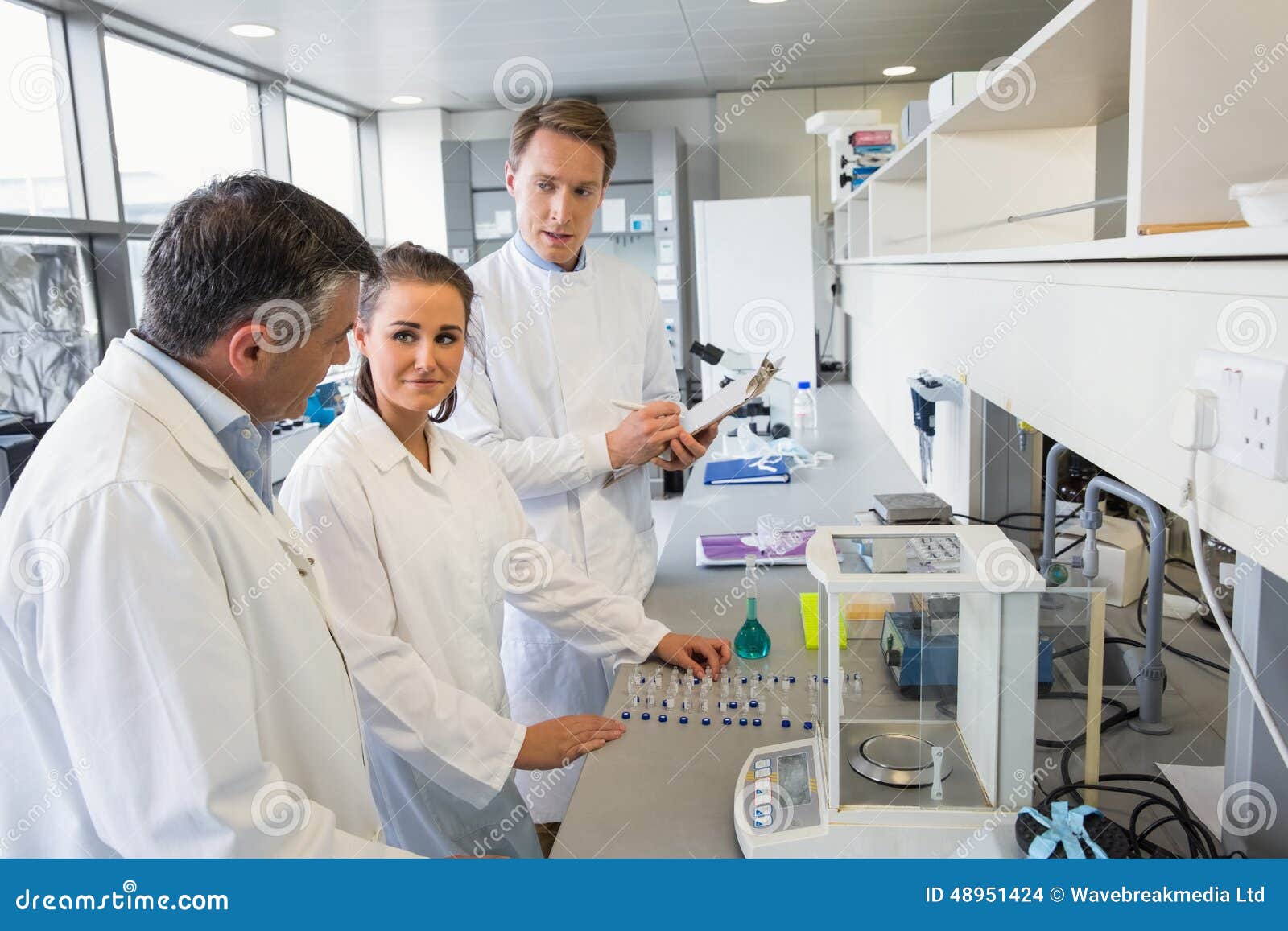 Team of Scientists Working Together Stock Photo - Image of adult ...