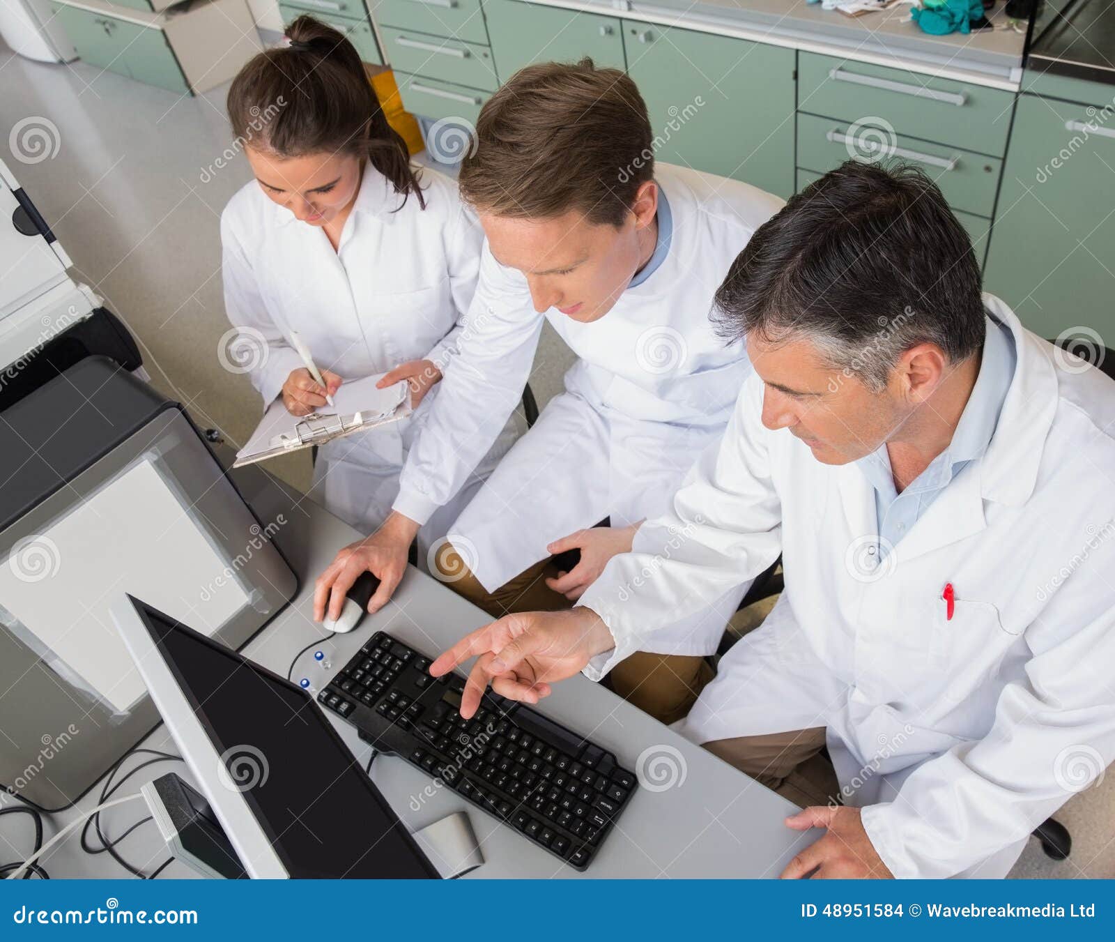 Team of Scientists Working Together Stock Photo - Image of microscope ...