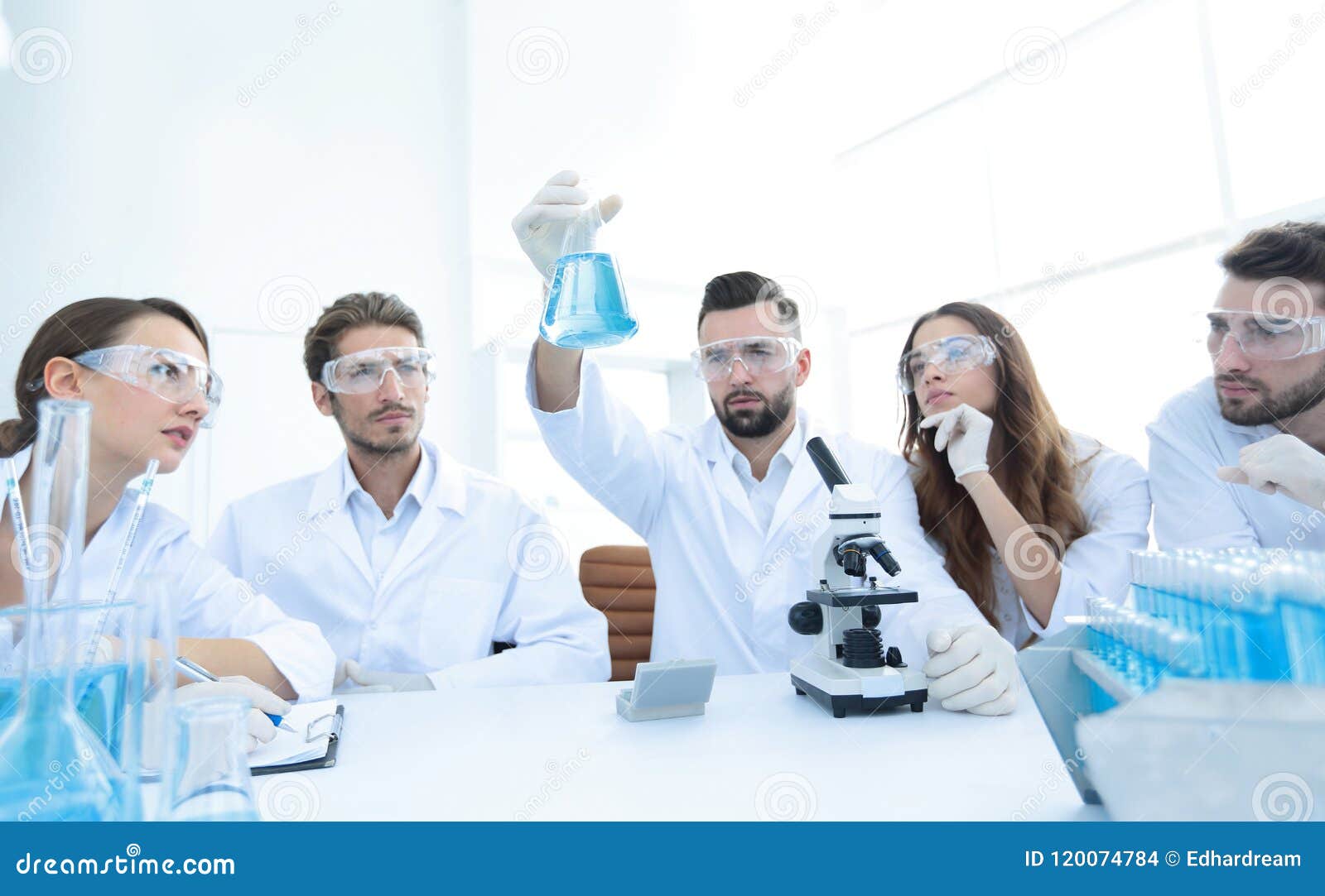 Team of Scientists Working Together at the Laboratory Stock Photo ... Team of Scientists Working Together at the Laboratory Stock Photo ...