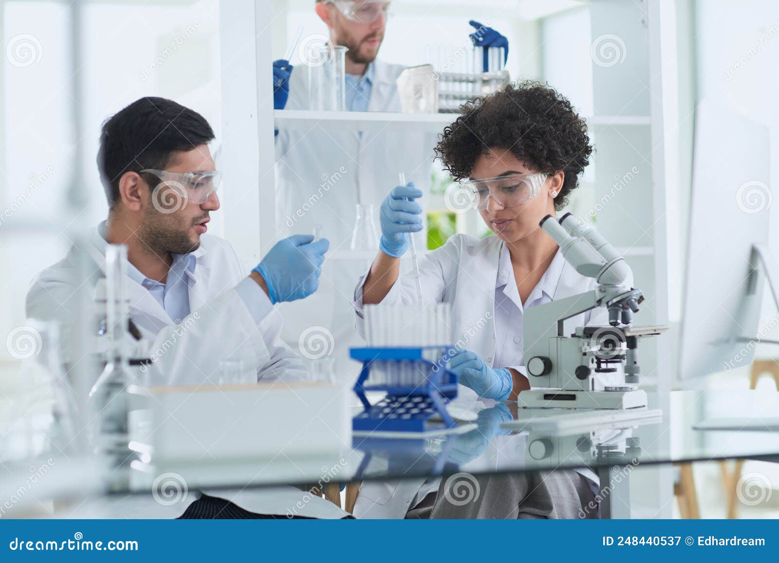 Team of Medical Research Scientists Working on Generation Experimental ...