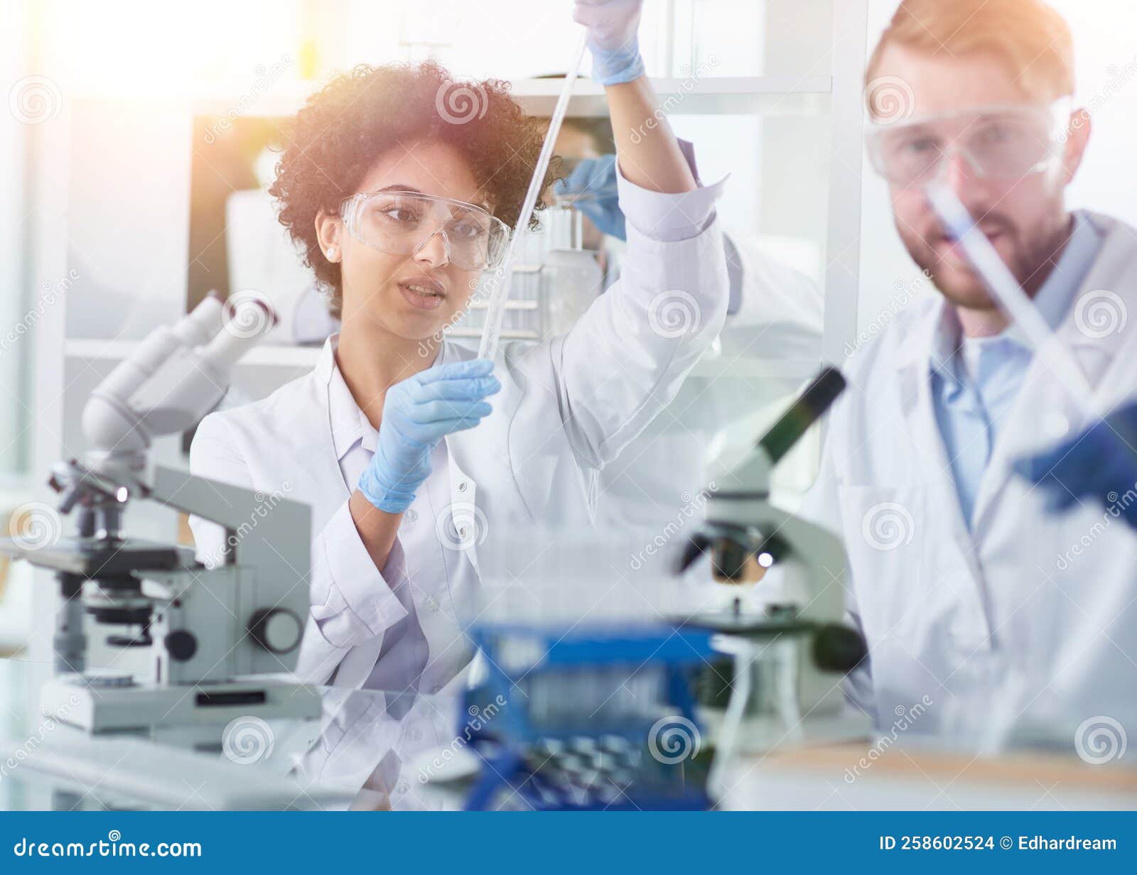 Team of Medical Research Scientists Working on Generation Experimental ...