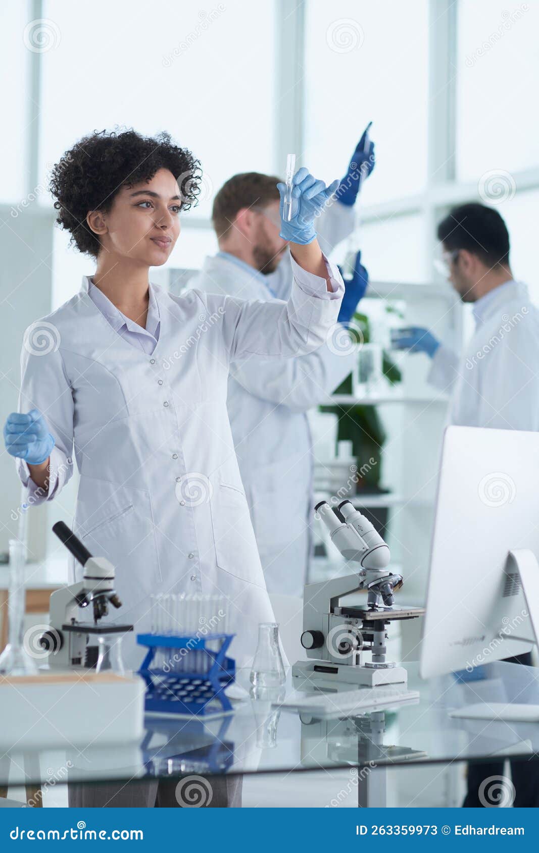 Team of Medical Research Scientists Working on Generation Experimental ...