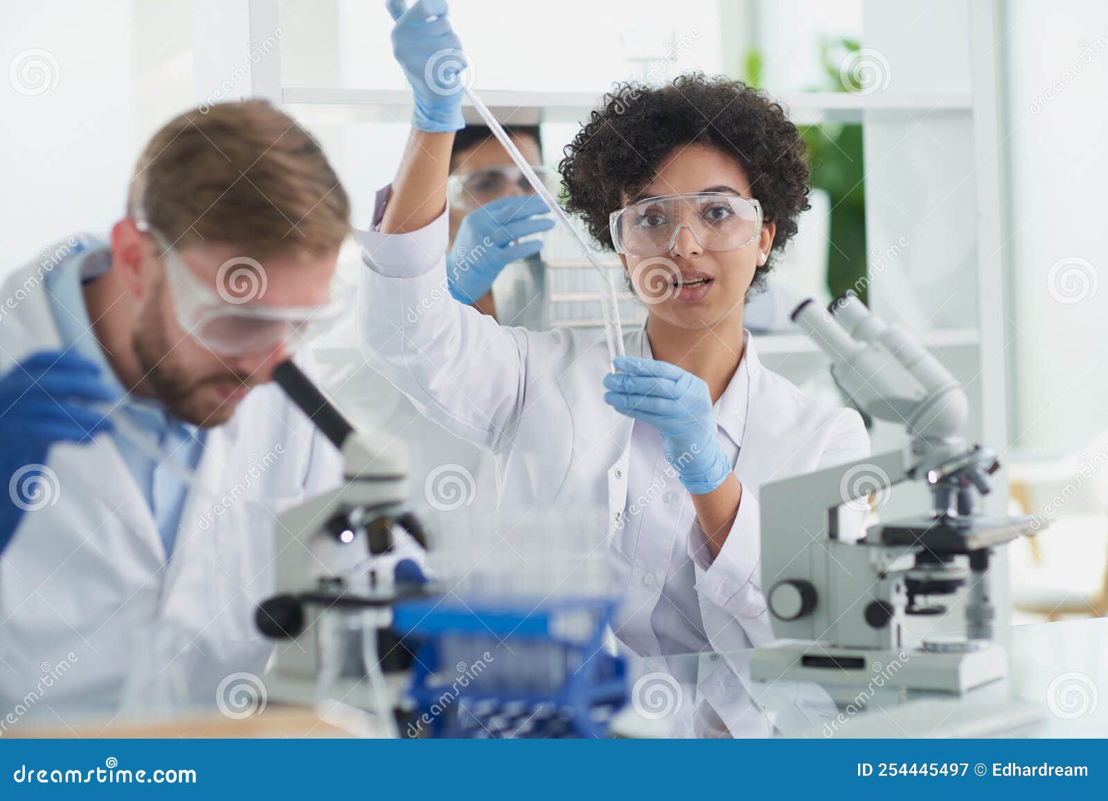Team of Medical Research Scientists Working on Generation Experimental ...