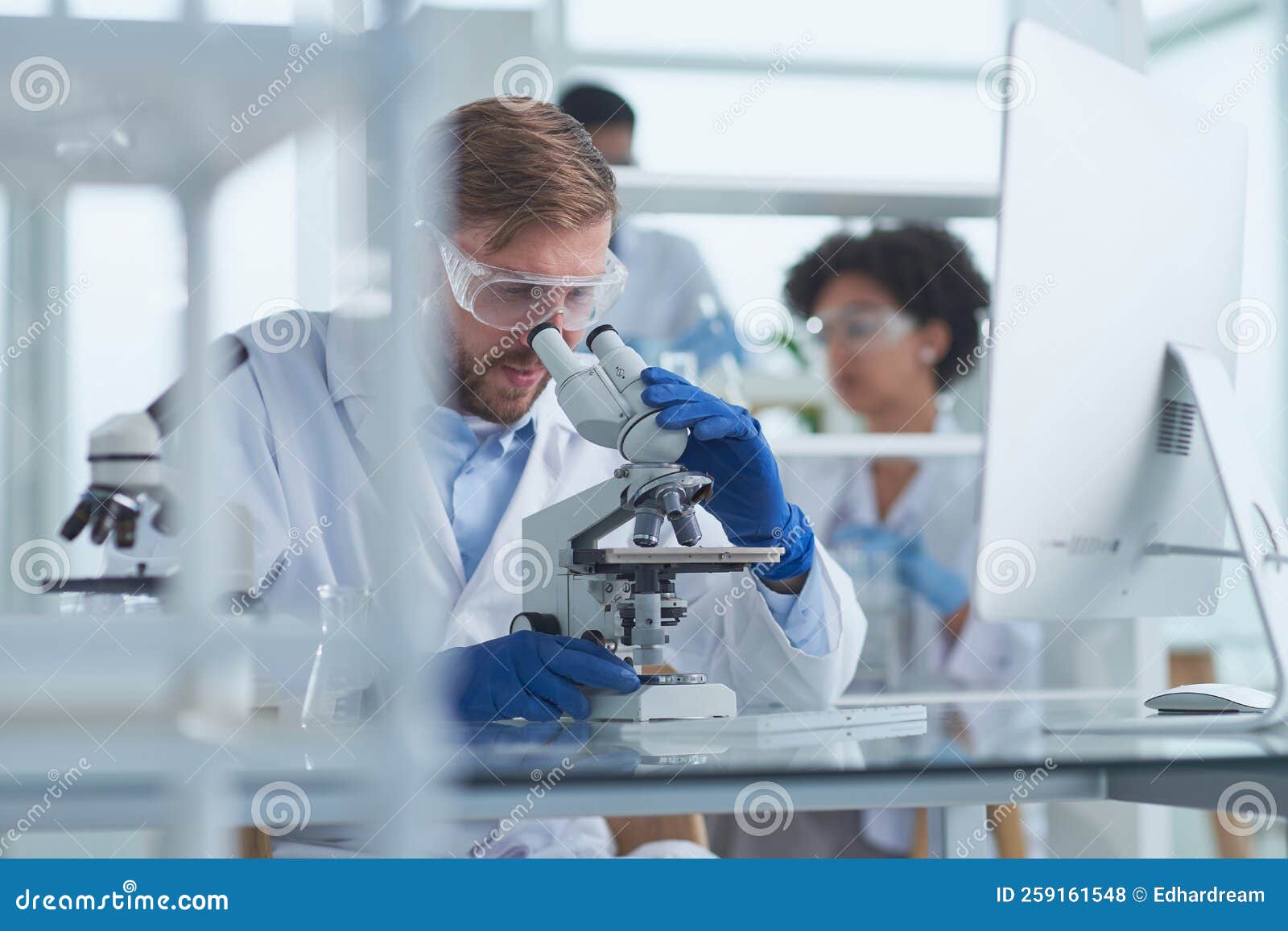 Team of Medical Research Scientists Working on Generation Experimental ...