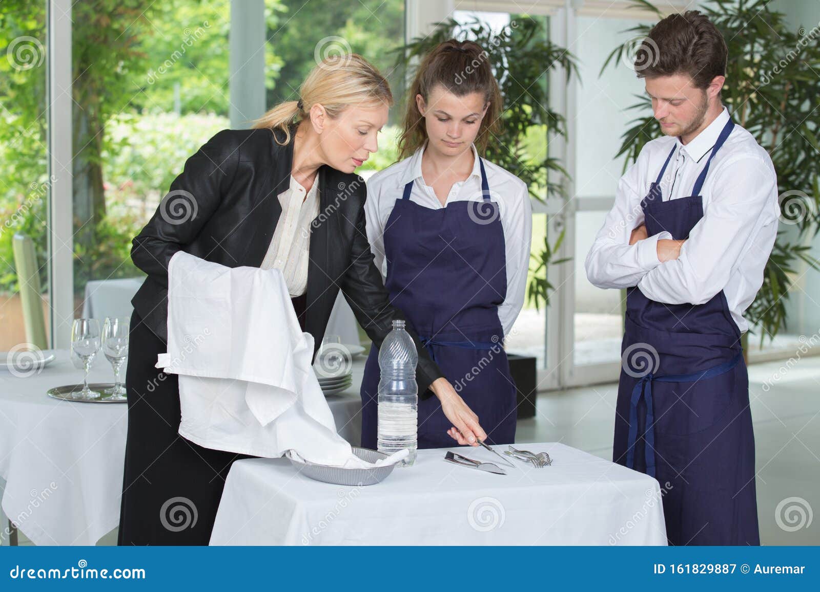 Team Setting Up Tables in Luxury Restaurant Stock Image - Image of ...
