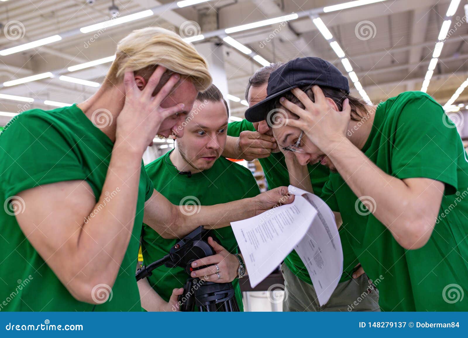 The Team is Shocked by the Script, Reading Papers. Backstage. Stock ...