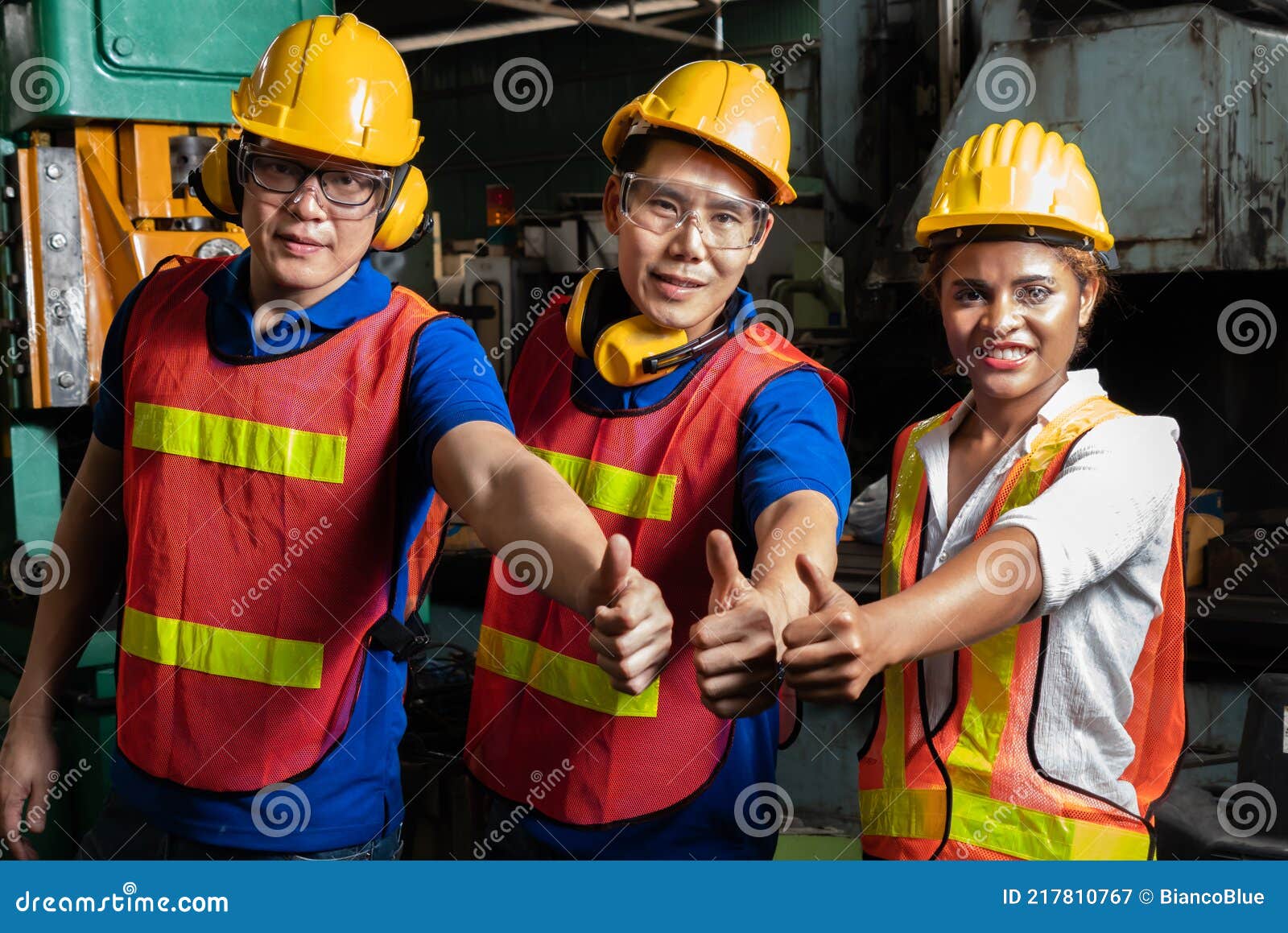 Team of Skillful Factory Workers Showing Unity Partnership and Support ...