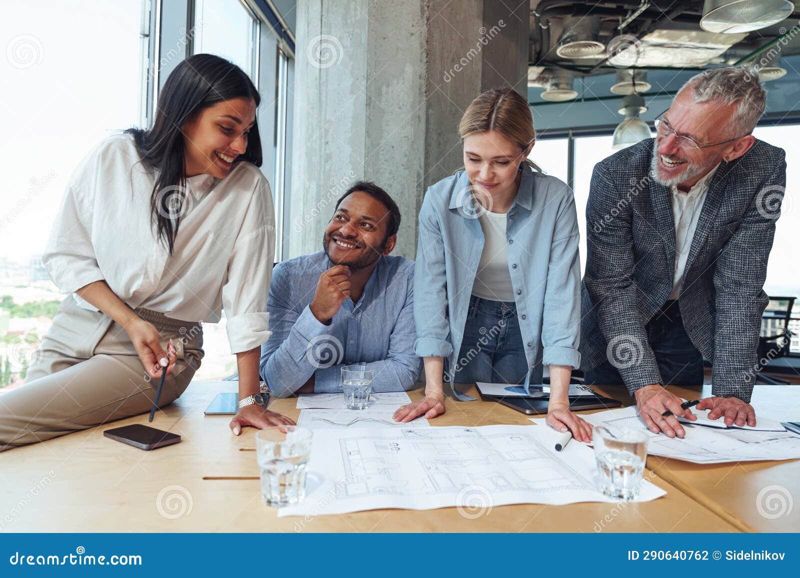 Team of Smiling Professional Design Engineers Working with Project ...