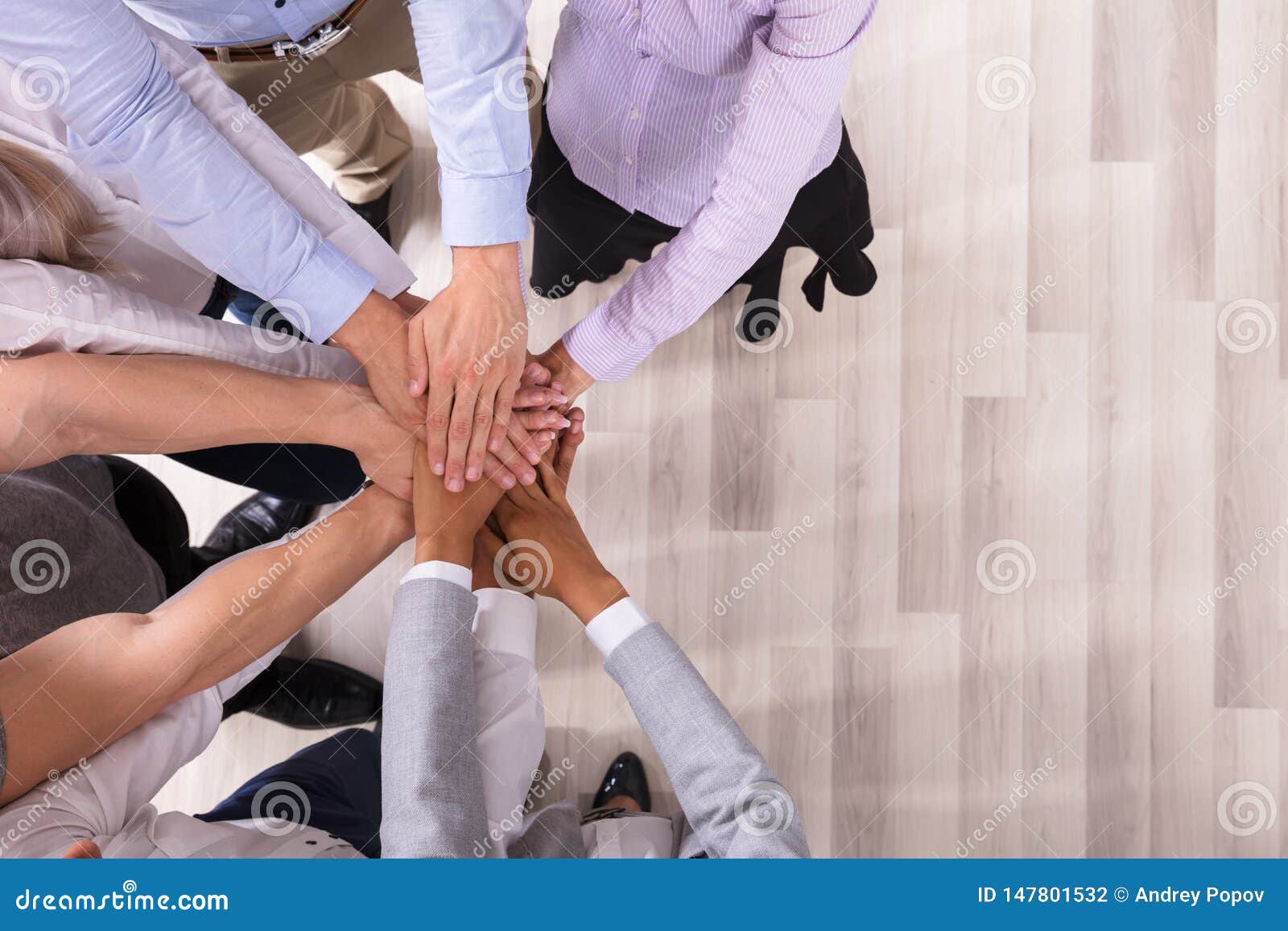 Team Stacking Their Hands stock photo. Image of agreement - 147801532