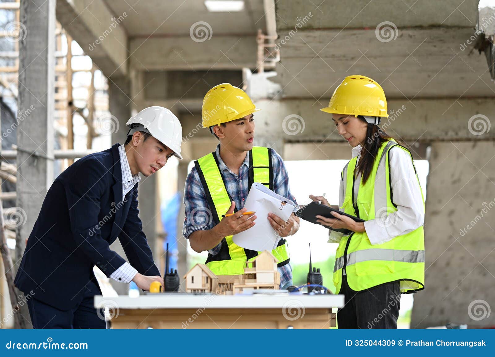 Team of Structural Engineers and Businessman Planning Development ...