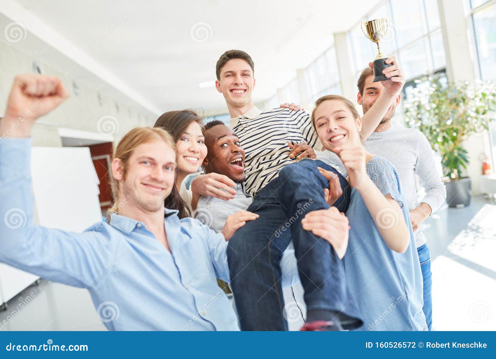 Team of Students with Trophy Stock Photo - Image of university ...