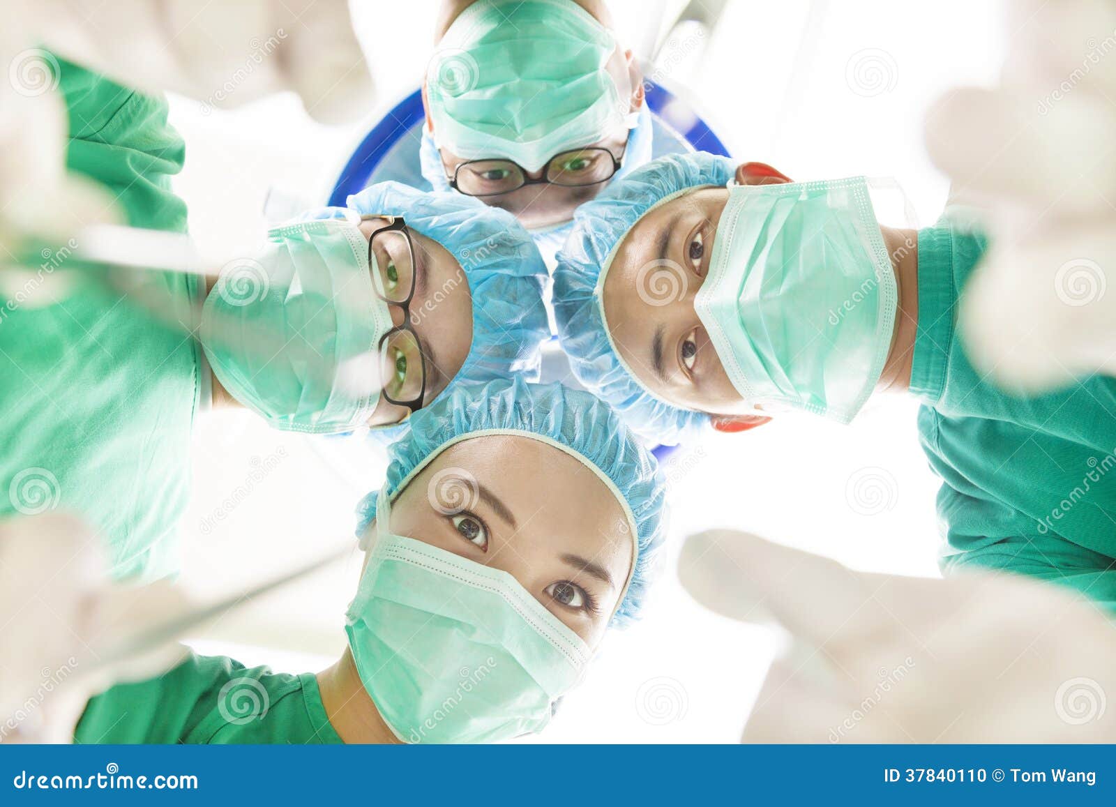 Team Surgeon At Work In Operating Room. Surgical Light In The Operating ...