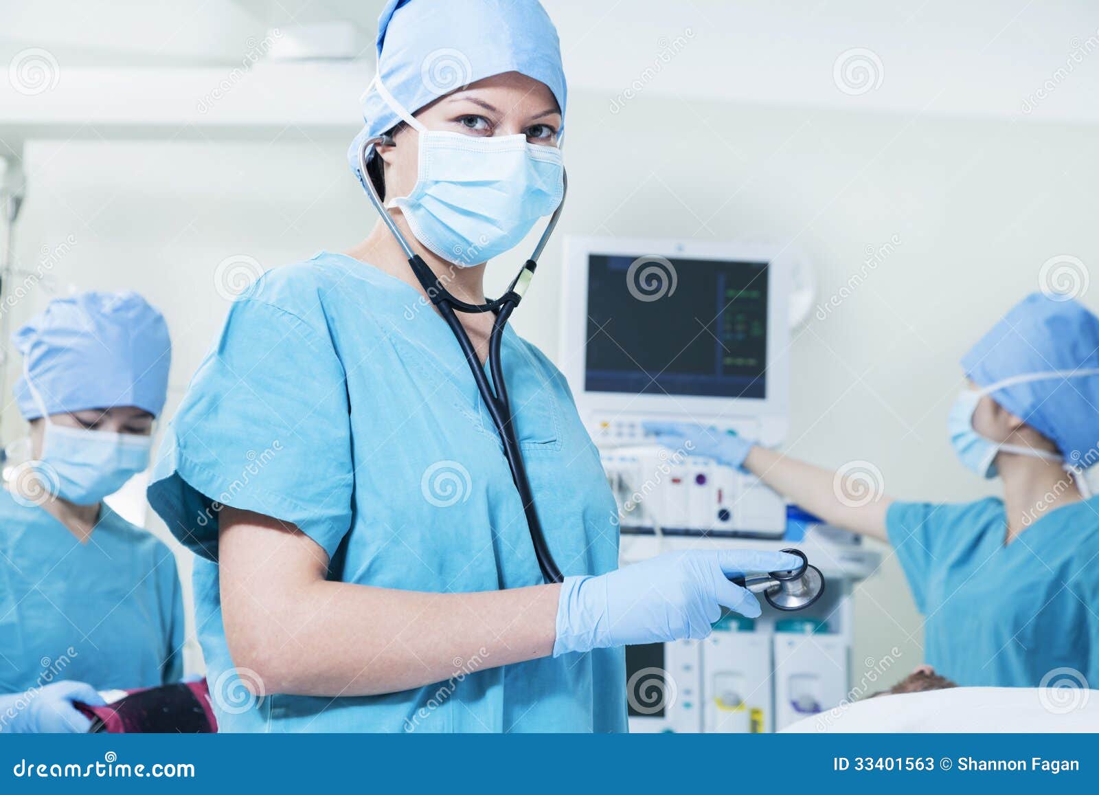 Team of Surgeons in the Operating Room, Female Surgeon Holding ...